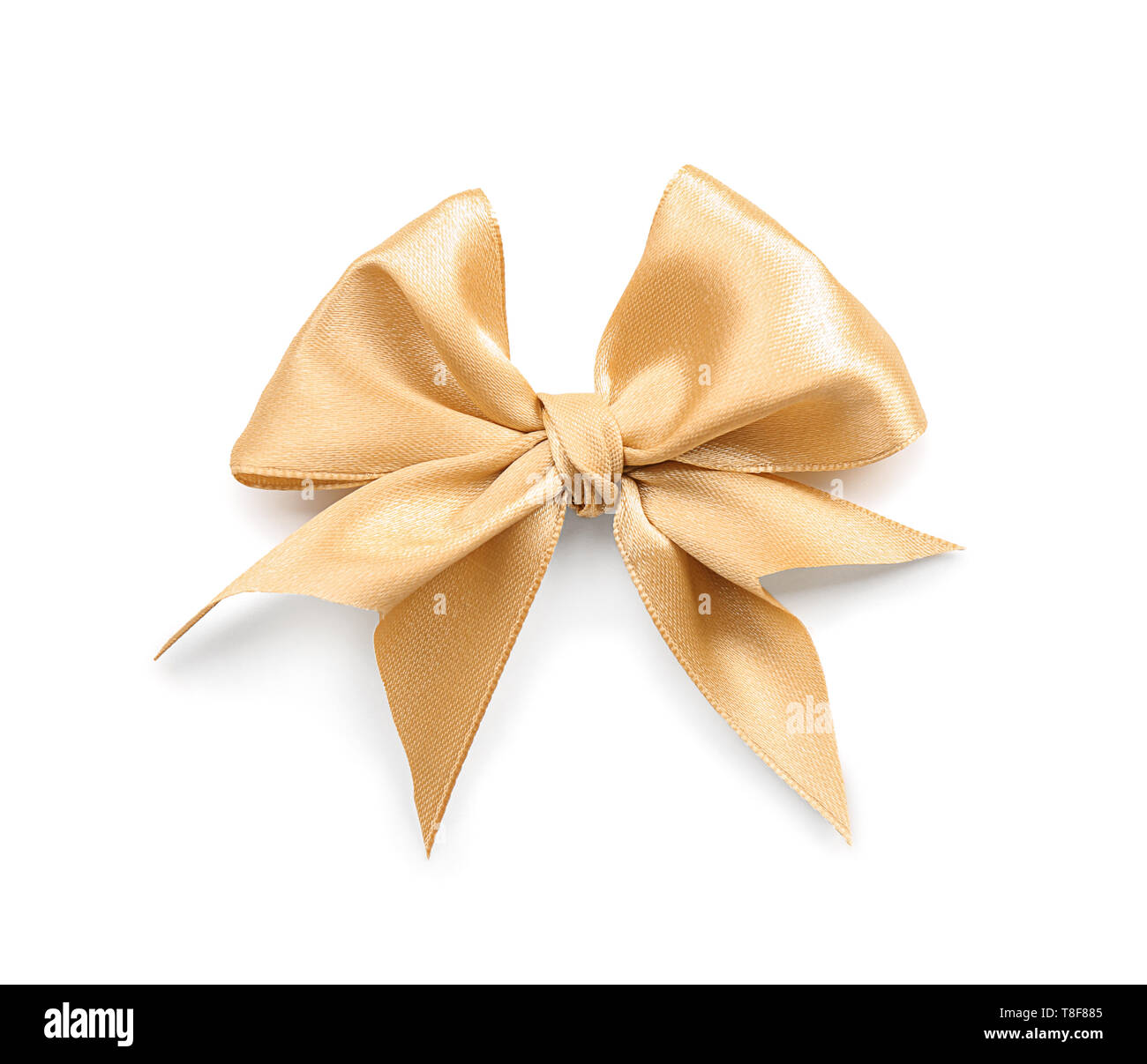 Beautiful bow made from golden ribbon on white background Stock Photo ...