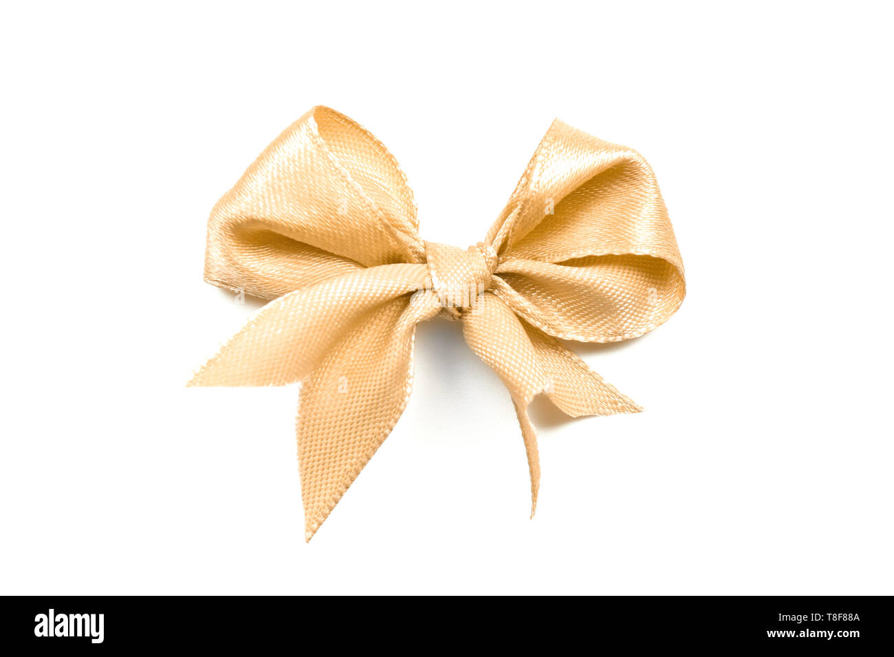 Beautiful bow made from golden ribbon on white background Stock Photo ...
