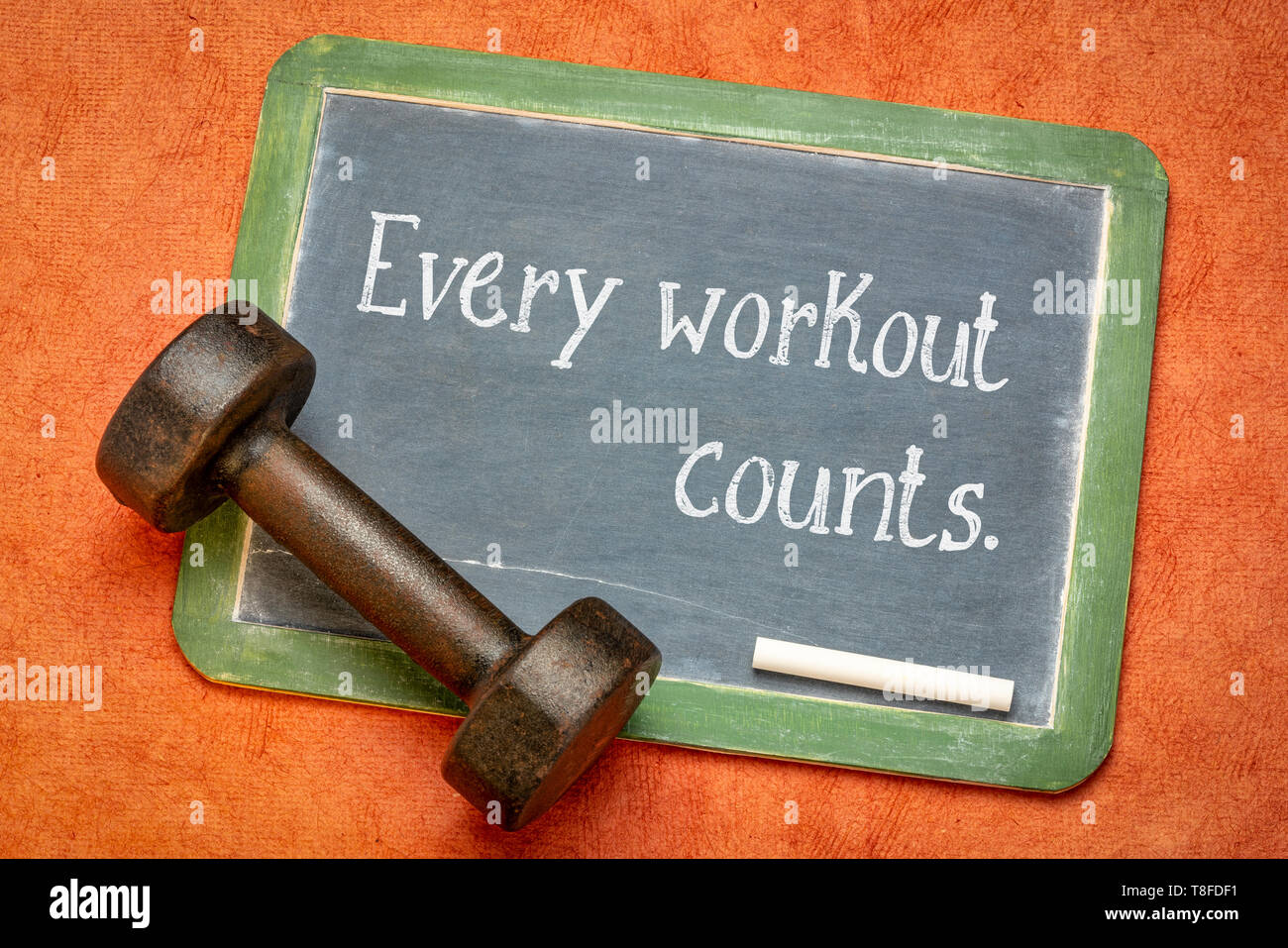 every workout counts, motivational sign - white chalk text on a slate ...