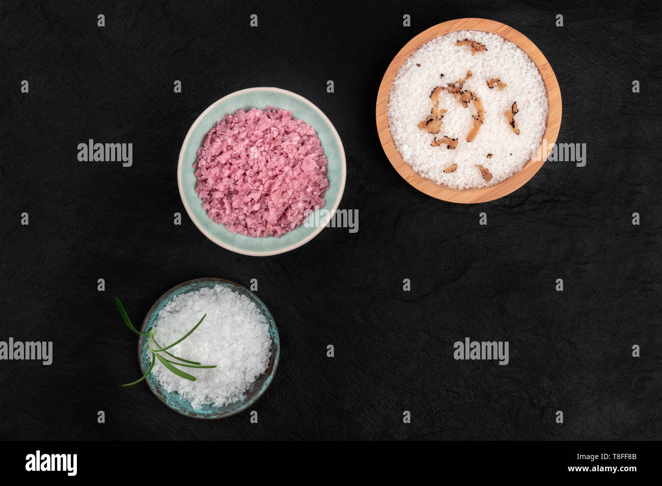 Gourmet spices. Various types of finishing salt, shot from above on a ...