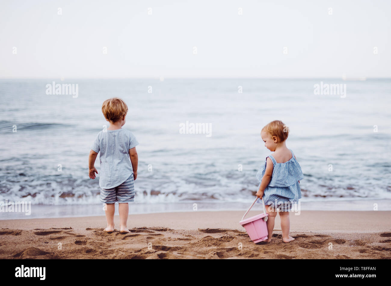 Children playing with sand hi-res stock photography and images - Alamy