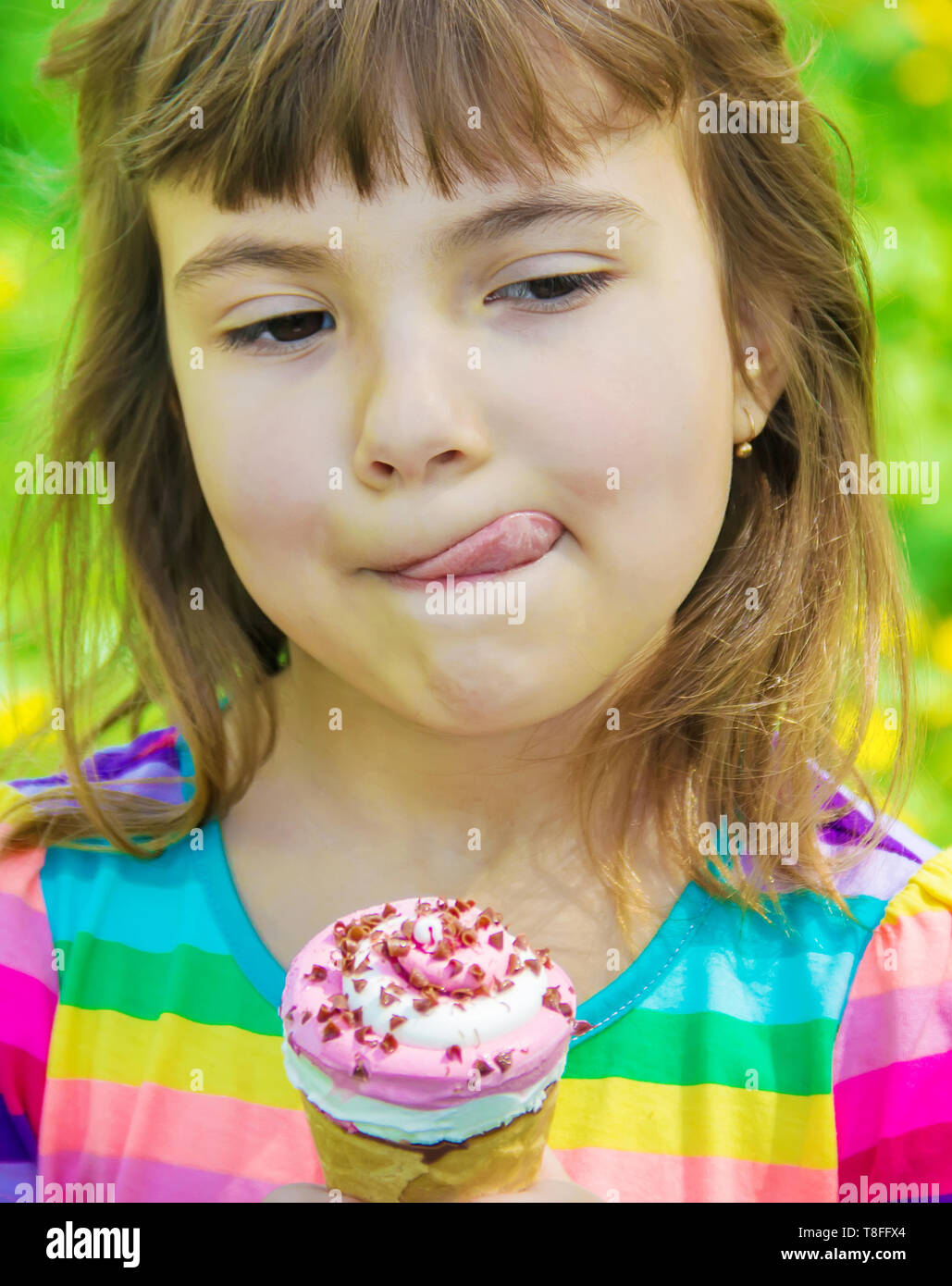 Child girl eats ice cream hi-res stock photography and images - Alamy