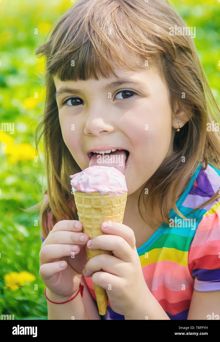 Child girl eats ice cream hi-res stock photography and images - Alamy