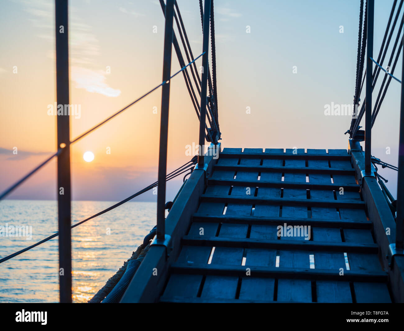 Sunset at the Sailboat deck while cruising in the Cyclades in Greece ...