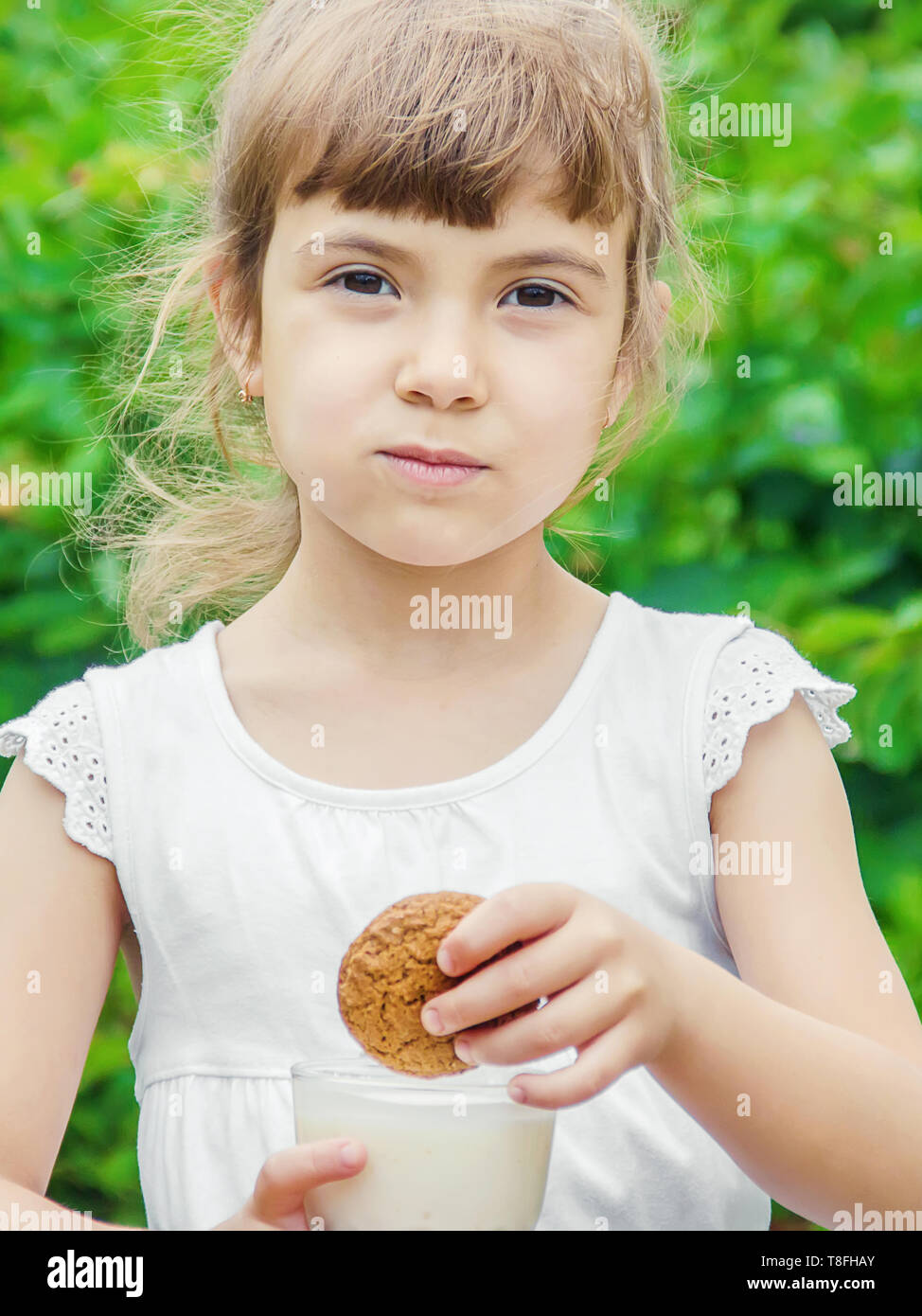 Kids cookies and milk hands hi-res stock photography and images - Alamy