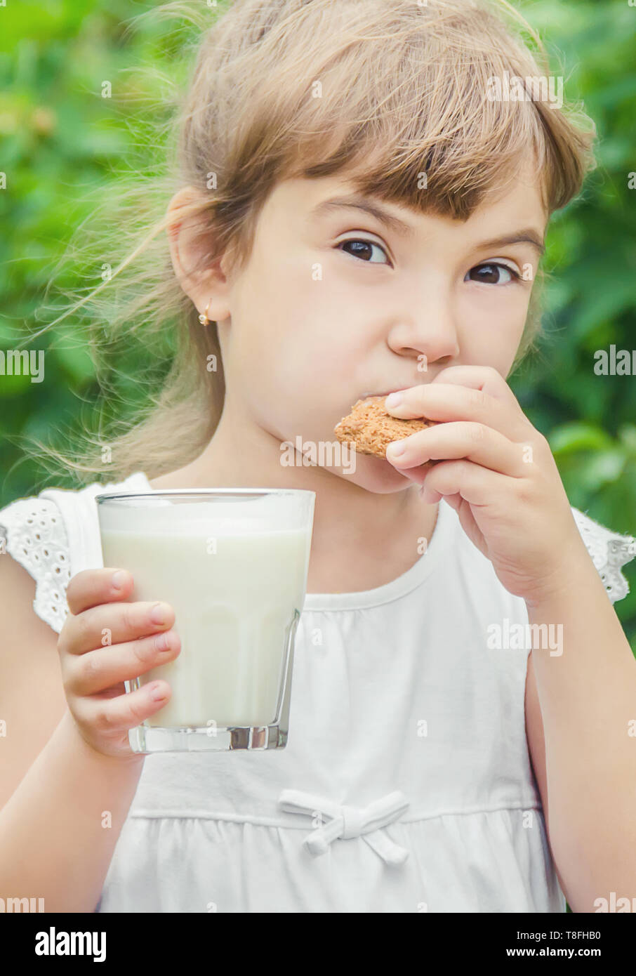 Kids cookies and milk hands hi-res stock photography and images - Alamy