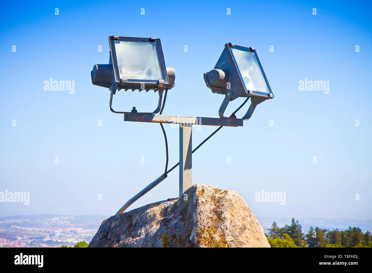 Two projectors of light against a sky background Stock Photo - Alamy