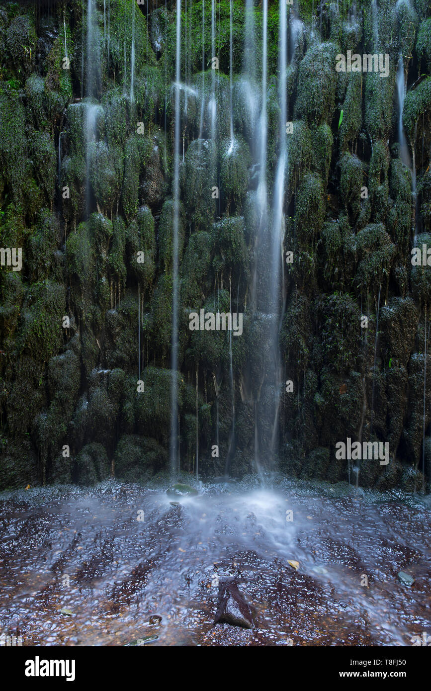 Waterfall over a man made dam, Glen Mooar, Isle of Man, UK Stock Photo ...
