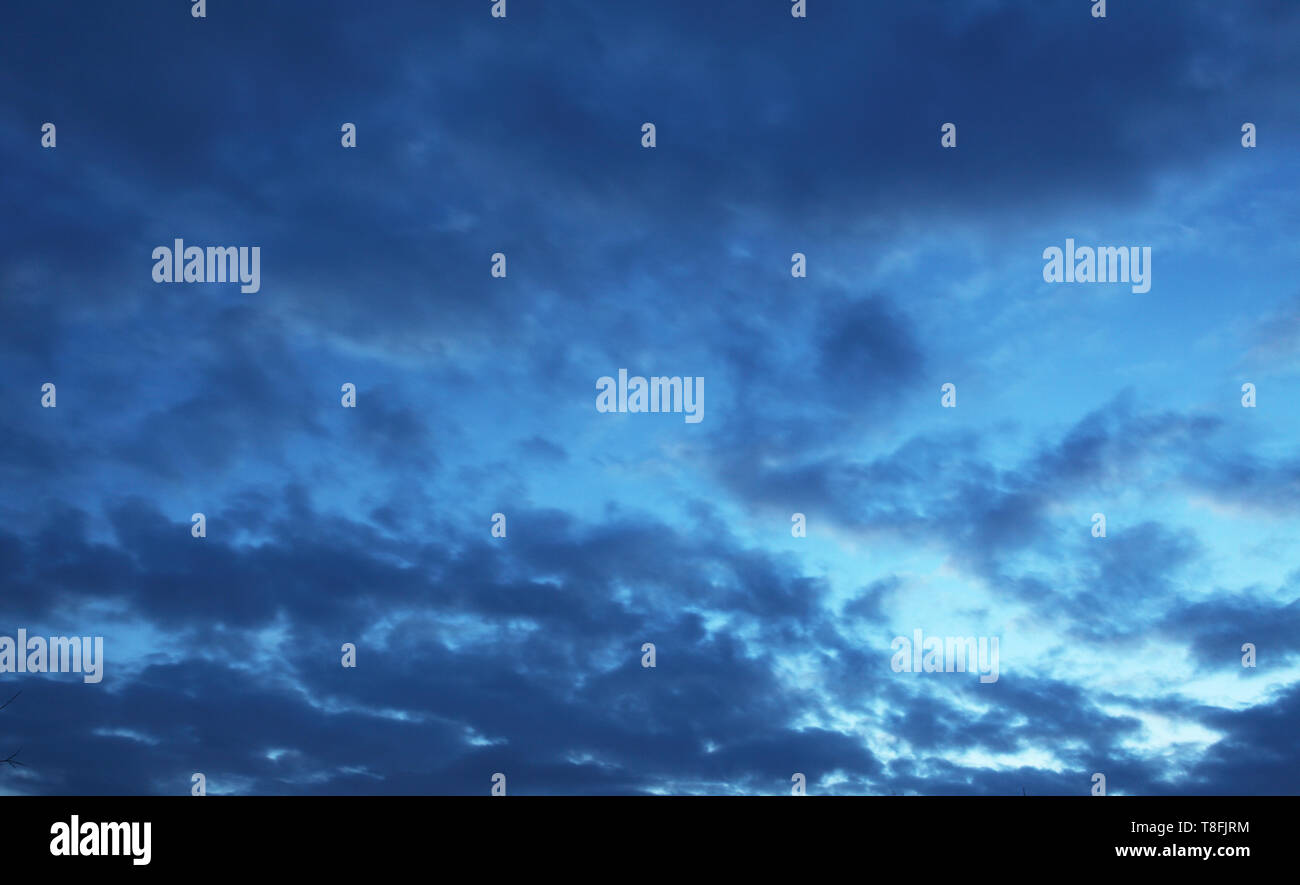 Blue sky with clouds Stock Photo - Alamy