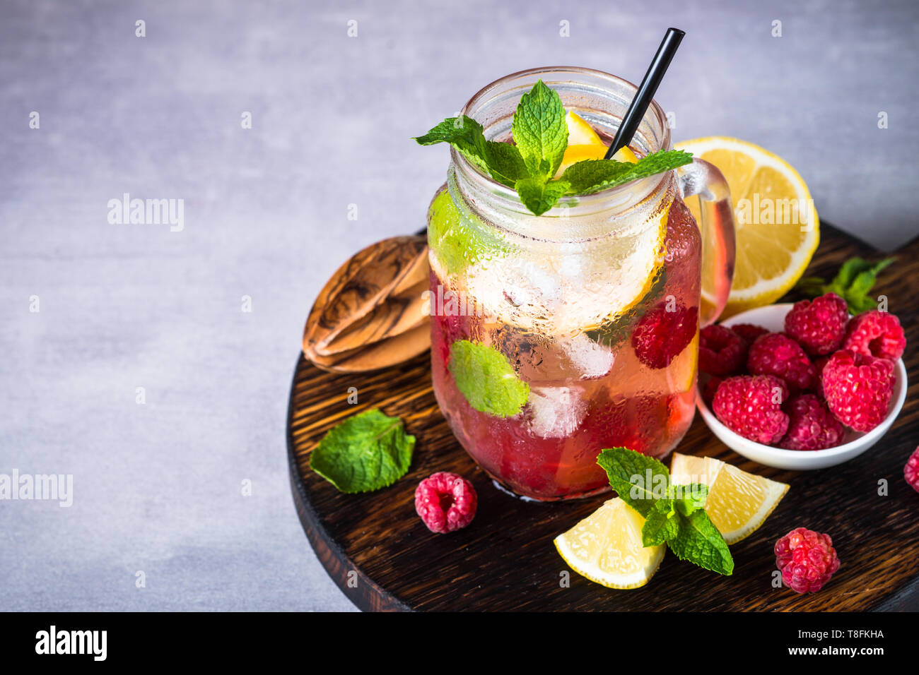 Raspberry lemonade in mason jar Stock Photo - Alamy