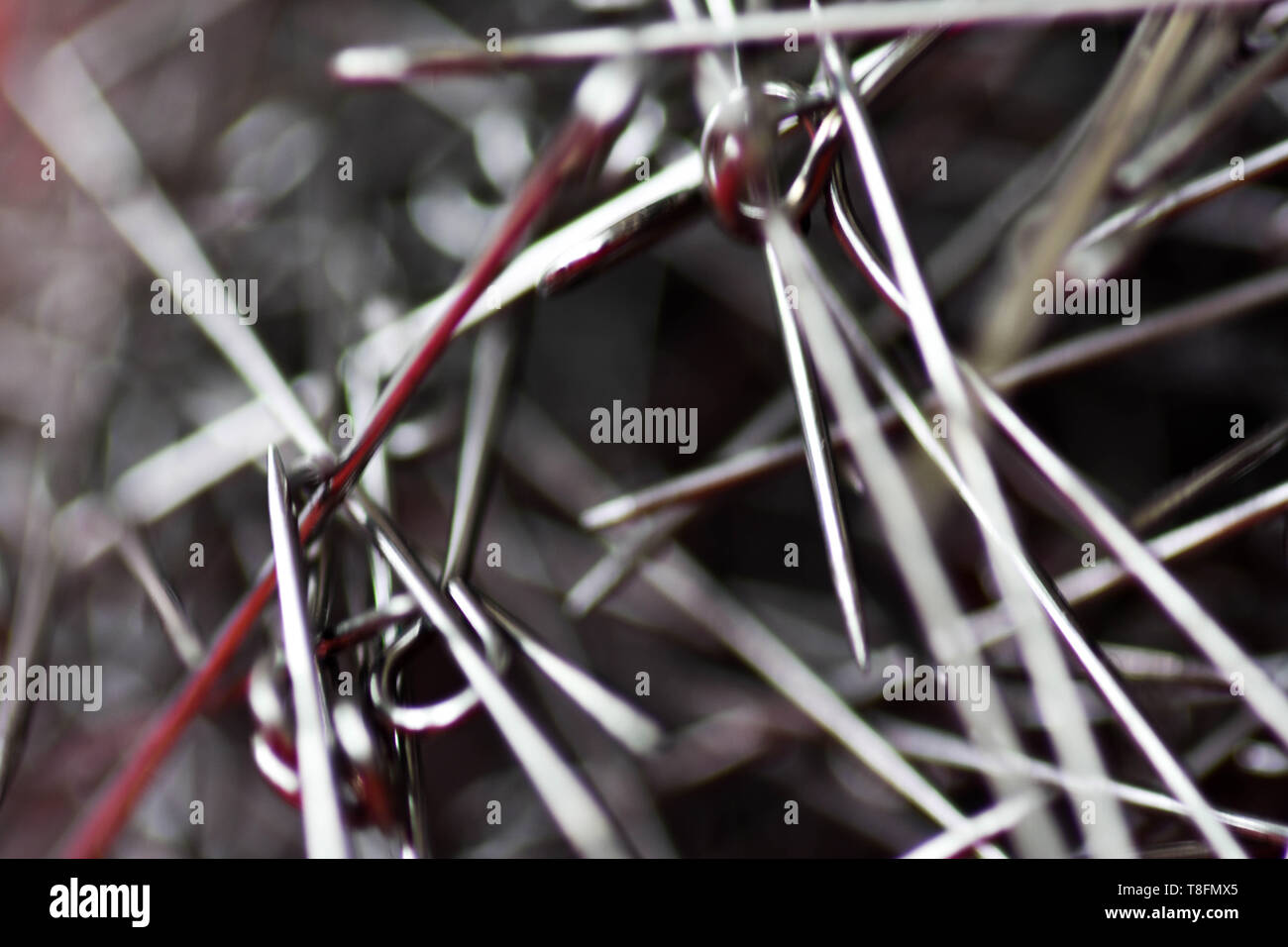 Sewing pin for connection of clothes Stock Photo - Alamy
