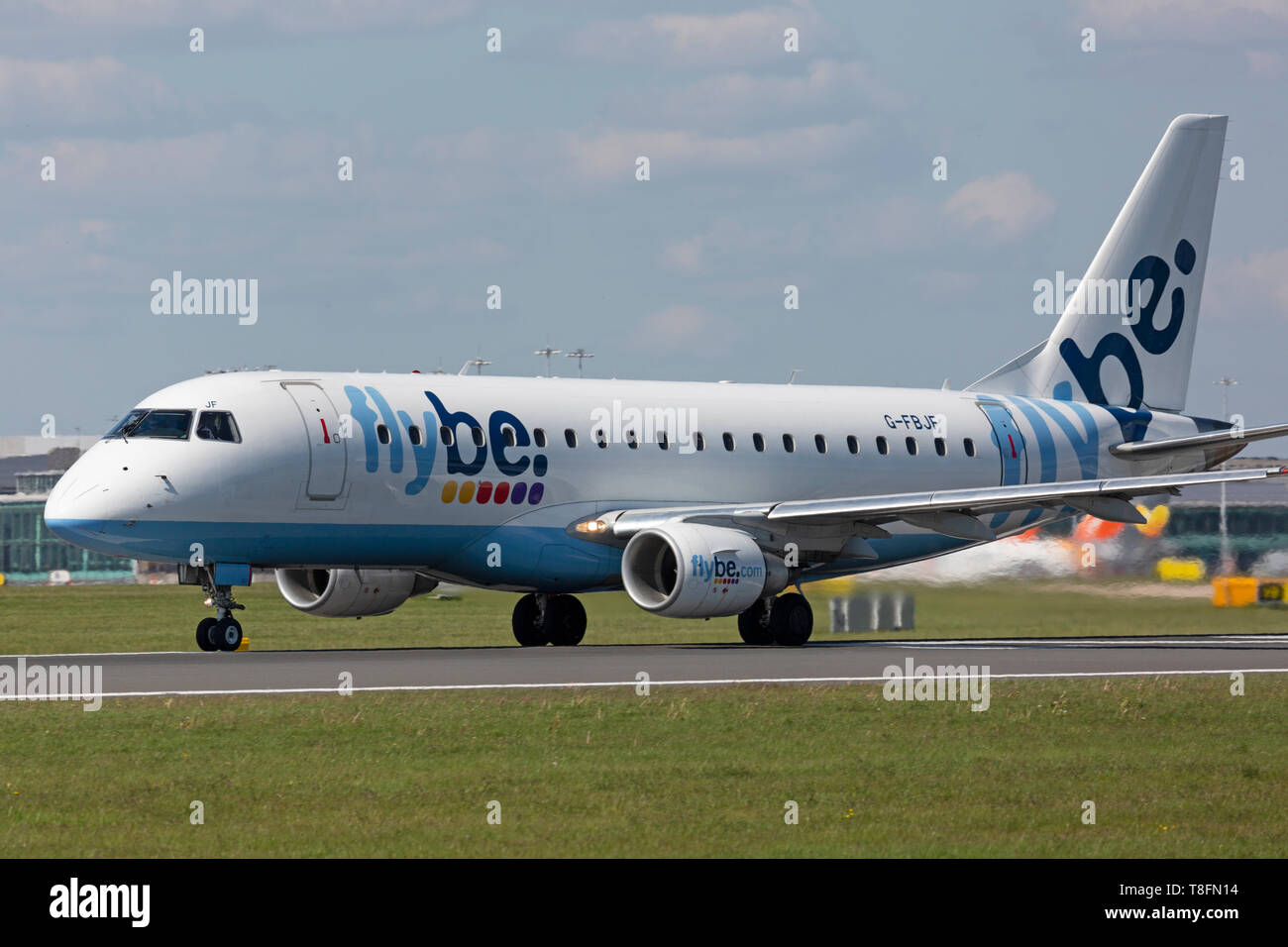 A Flybe Embraer ERJ-175 aircraft, registration G-FBJF, taking off from ...