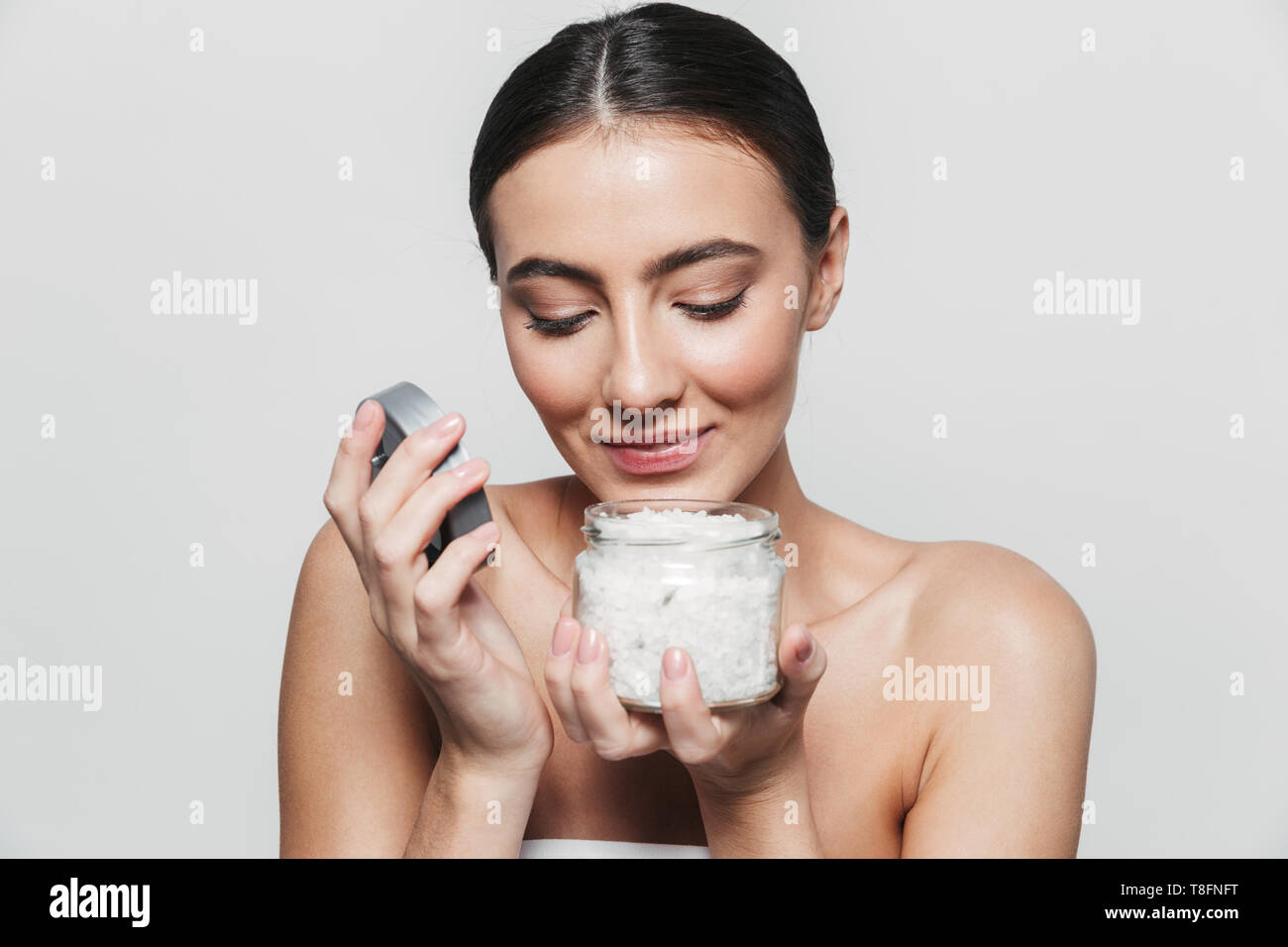 Beauty portrait of a young healthy attractive brunette woman standing ...