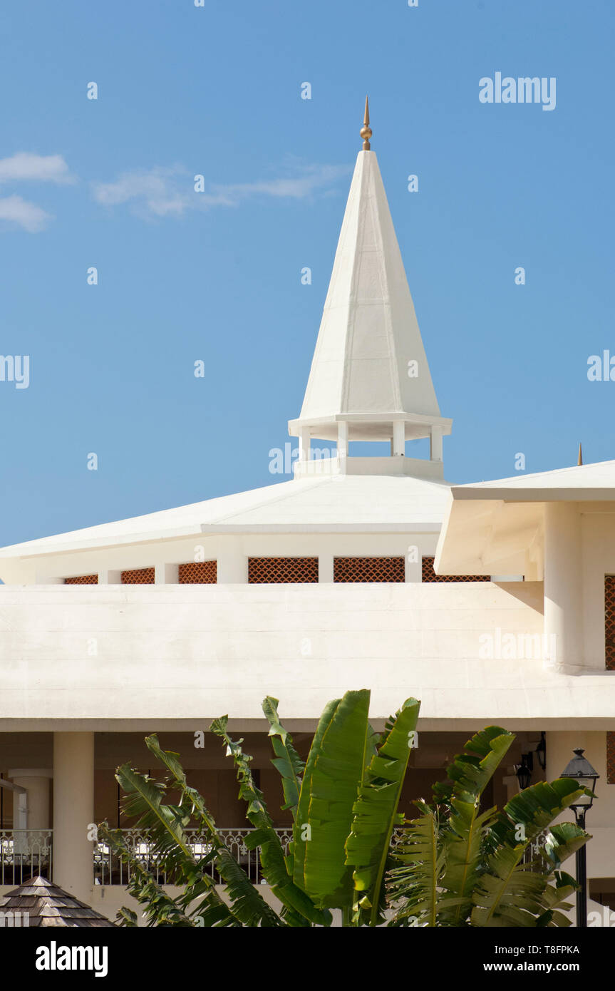 White spire and white building of Riu Negril resort Stock Photo - Alamy