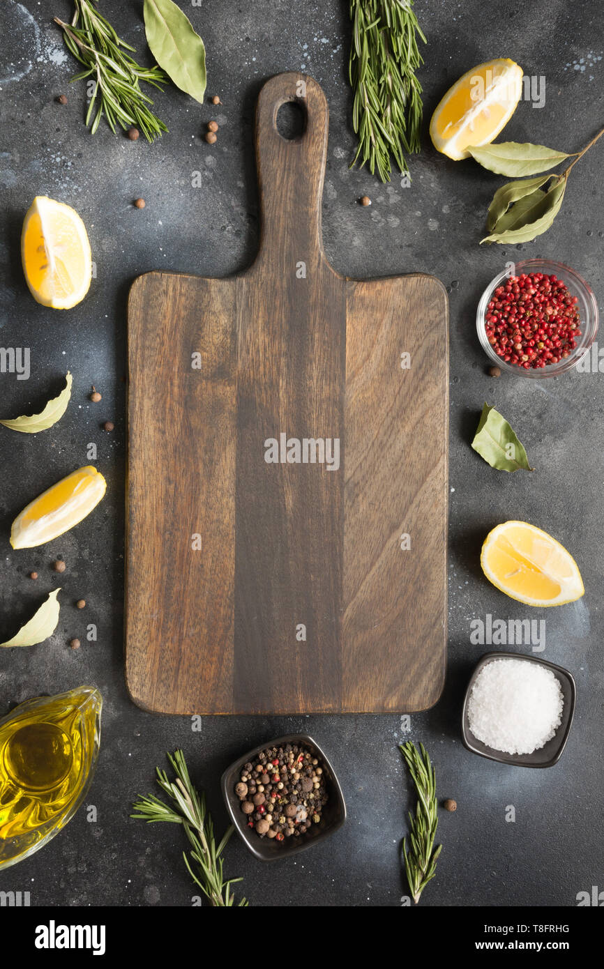 Border with lemon, herbs, spices for fish marinade on vintage grey ...