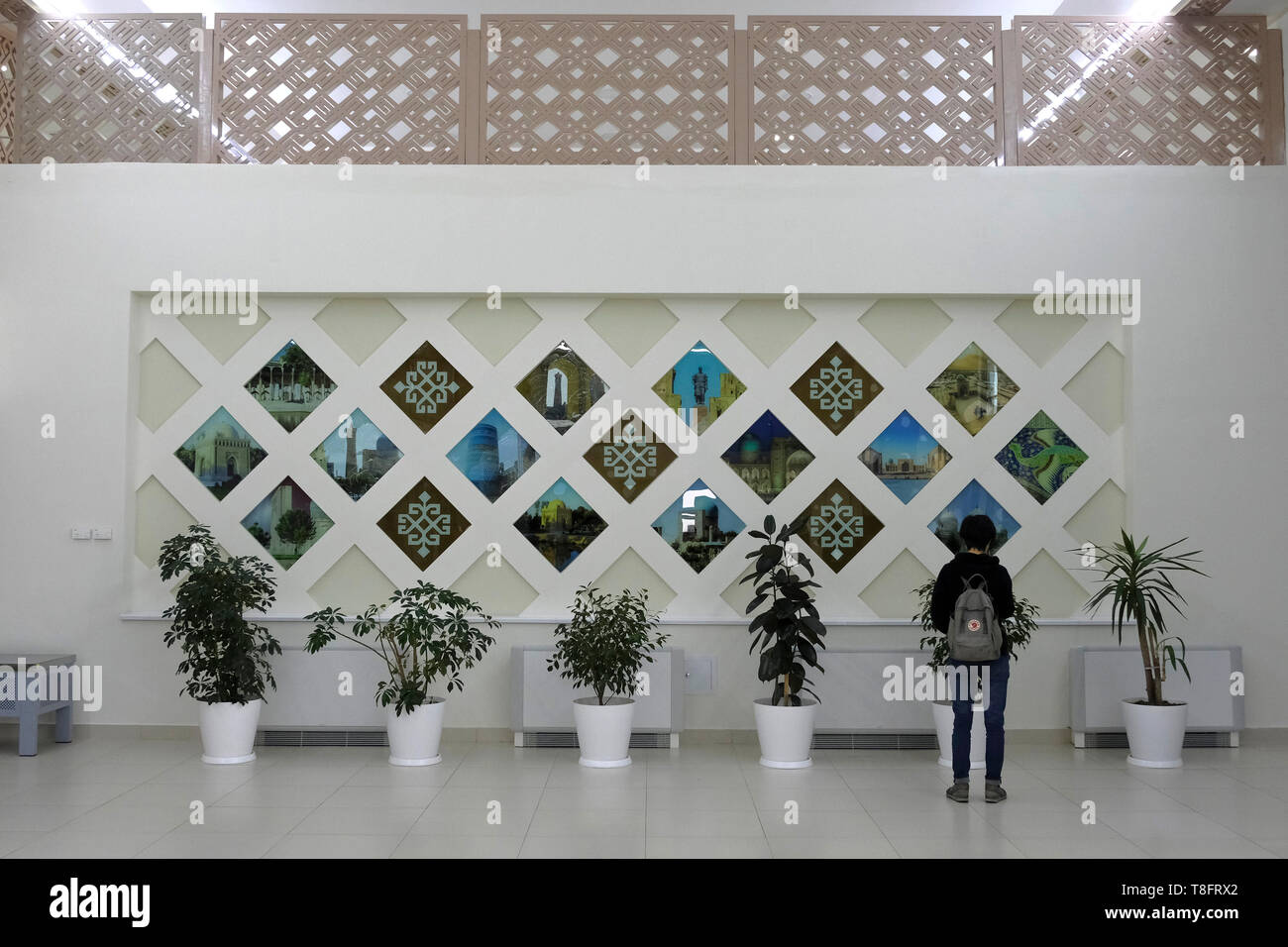 A tourist stands at the terminal of Nukus Airport serving Nukus, the ...