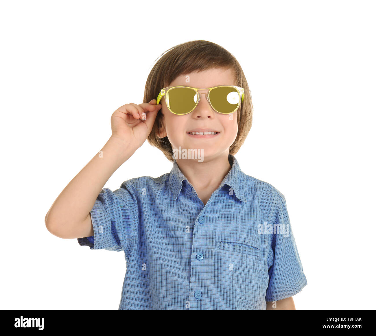 Cute little boy with stylish sunglasses on white background Stock Photo ...