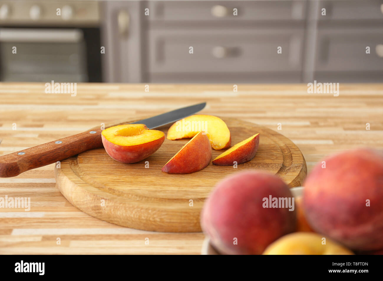 Board sliced peaches on hi-res stock photography and images - Alamy