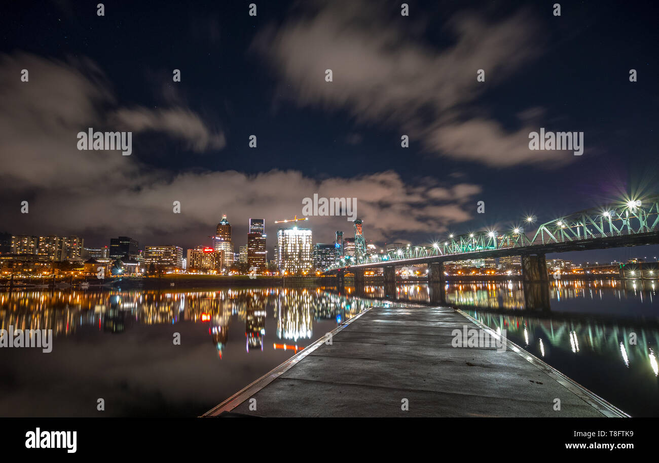 Long Exposure View of Downtown Portland With Clouds Over it Stock Photo ...