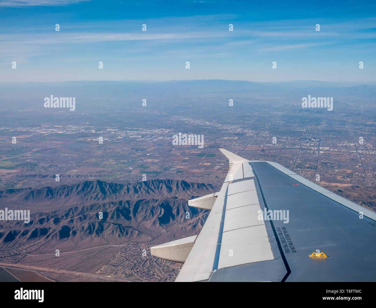 Commertial Airplane Making a Left Turn OVer Phoenix Arizona Stock Photo ...