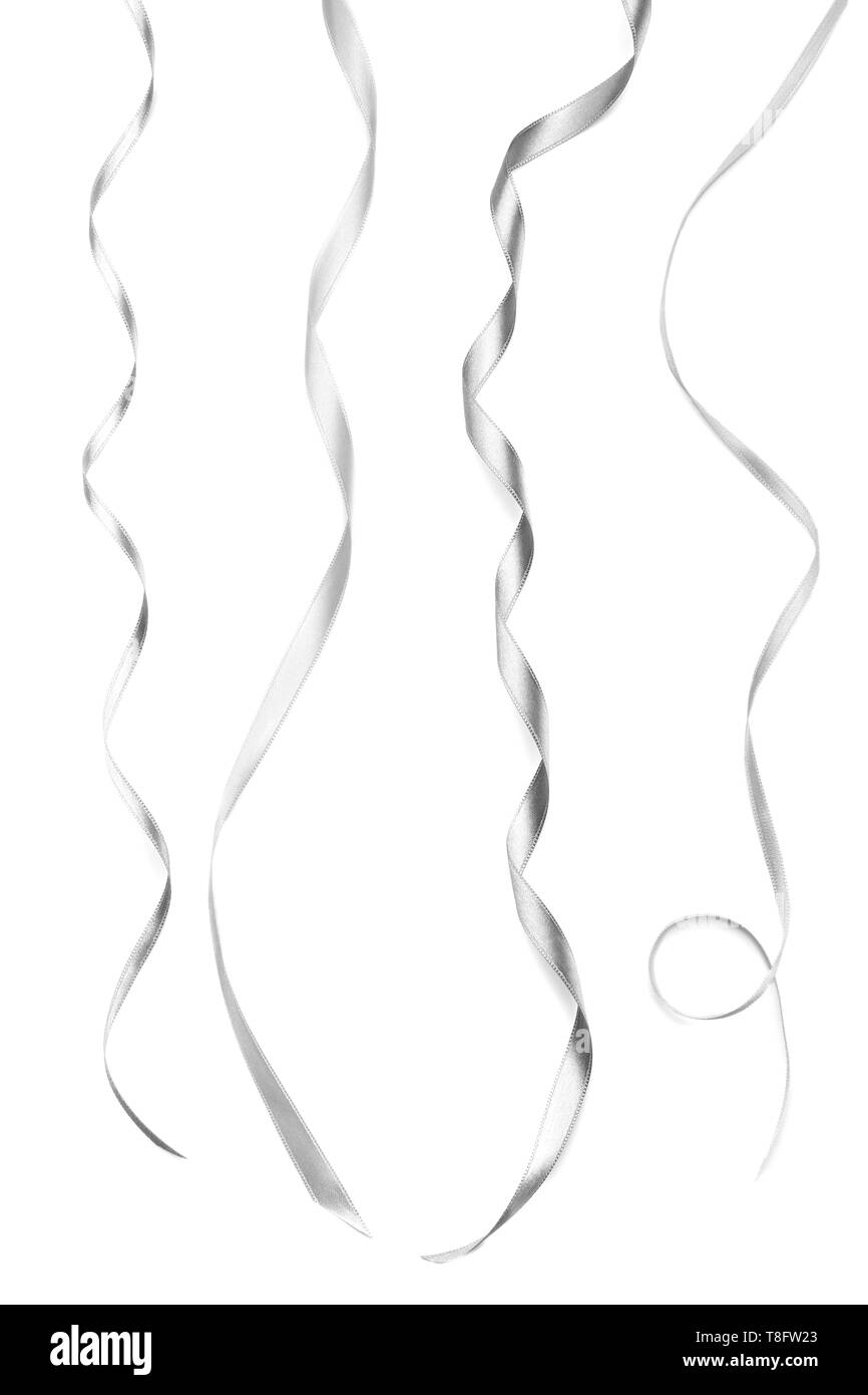 Silver ribbons on white background Stock Photo - Alamy