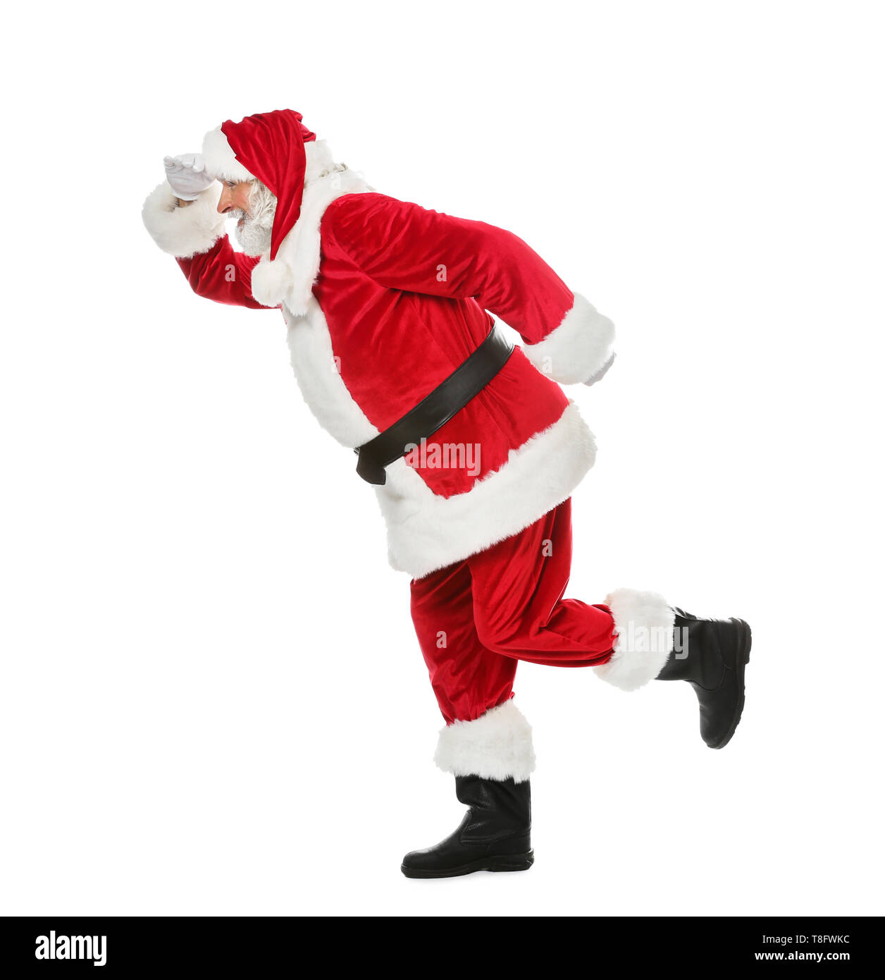 Running Santa Claus on white background Stock Photo - Alamy