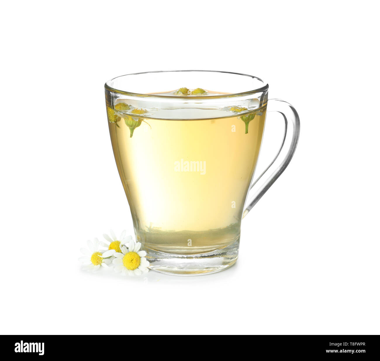 Glass cup of delicious camomile tea on white background Stock Photo - Alamy