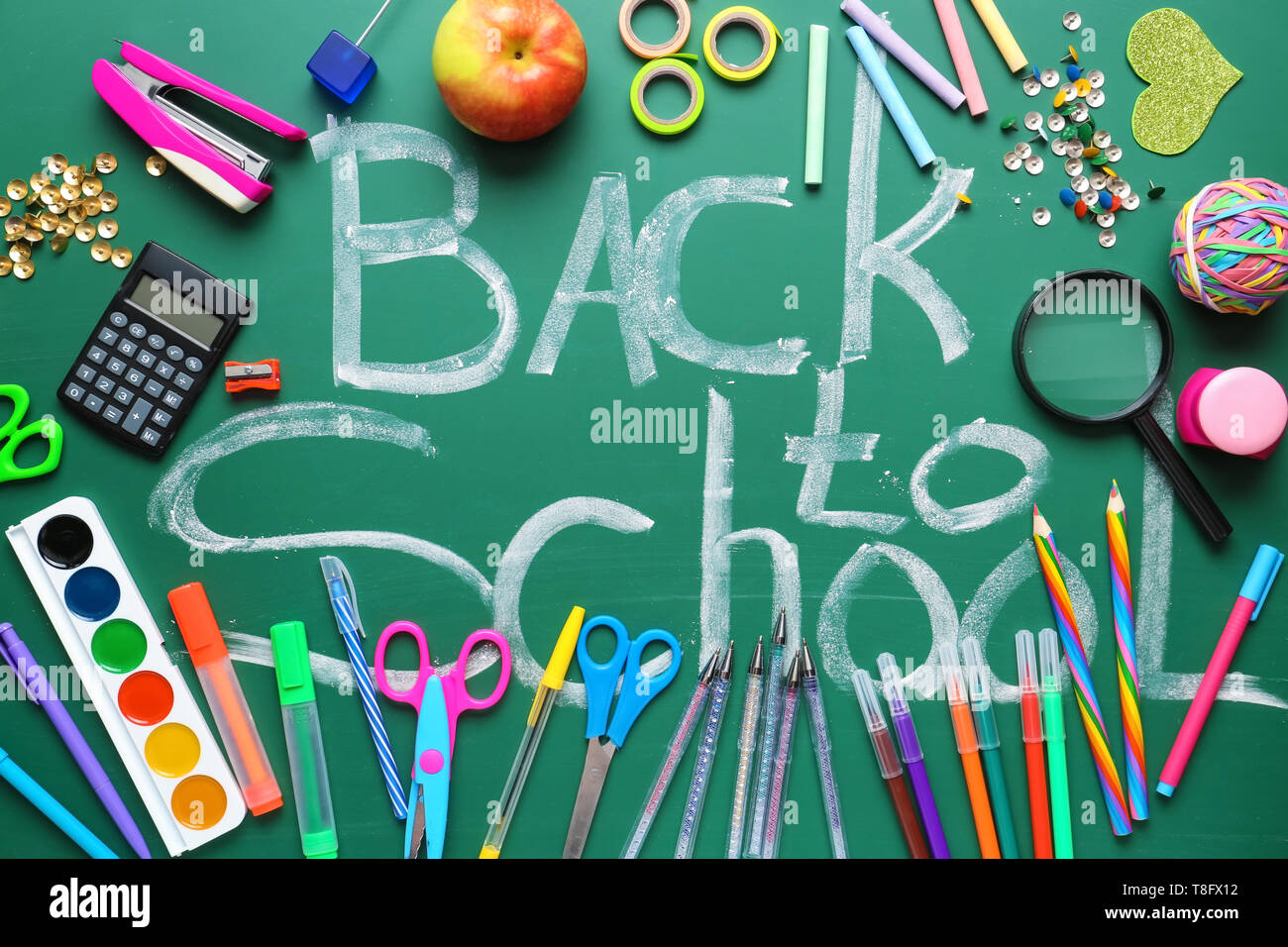 Set of stationery and words BACK TO SCHOOL on chalkboard Stock Photo ...