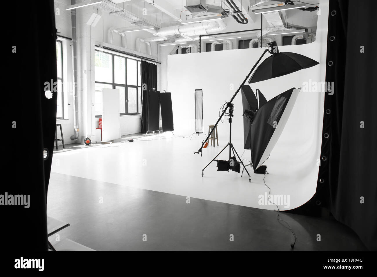 Interior of modern photo studio with professional equipment Stock Photo ...