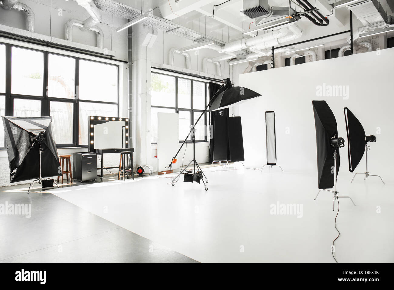 Interior of modern photo studio with professional equipment Stock Photo ...