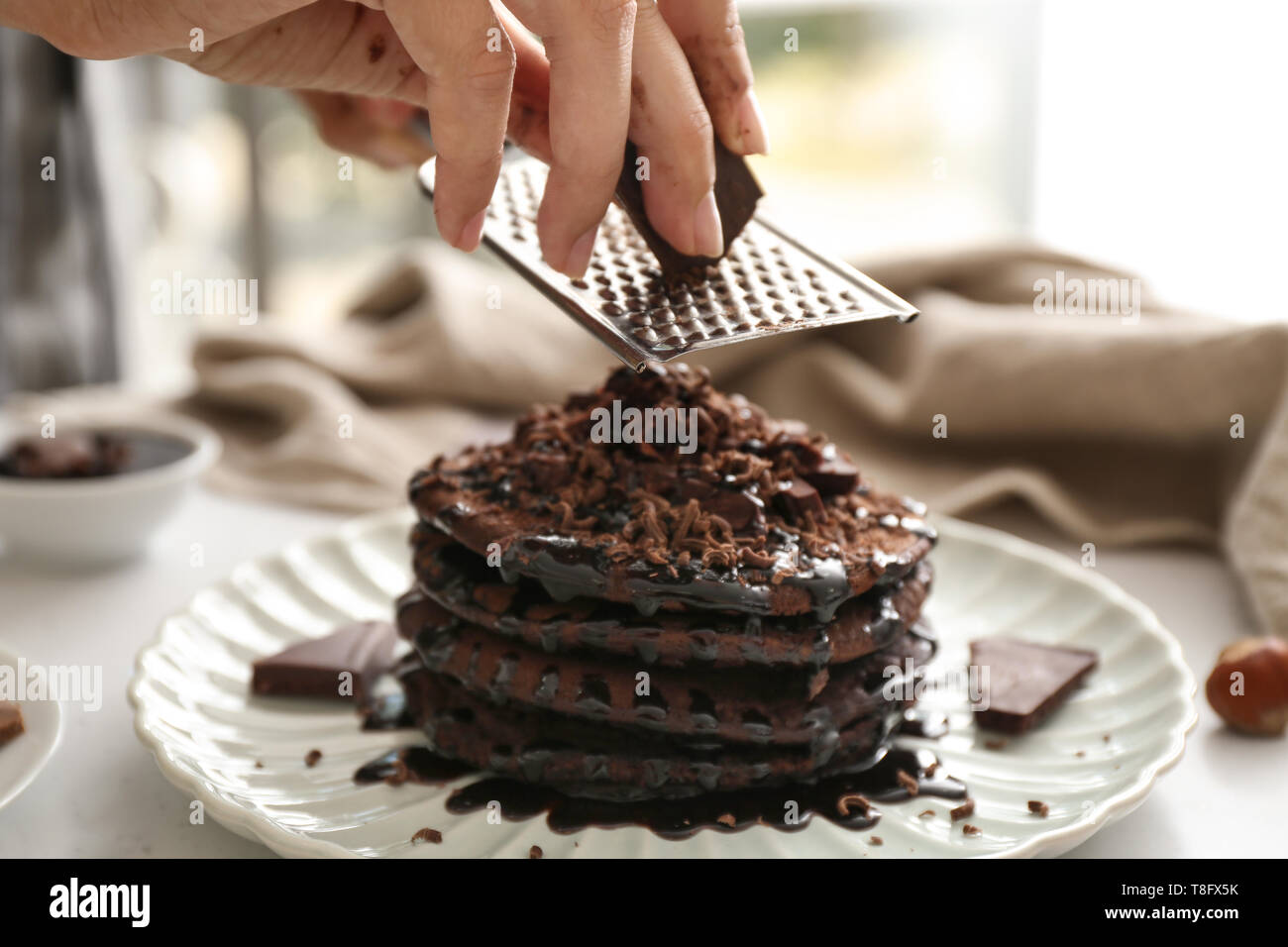 White chocolate grating hi-res stock photography and images - Alamy