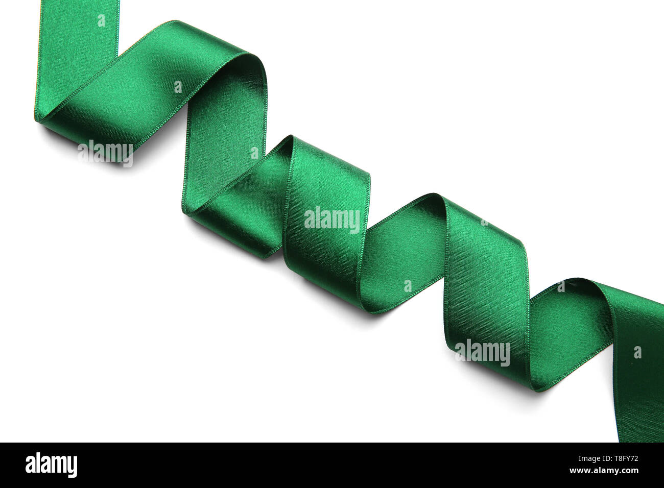 Green ribbon on white background Stock Photo - Alamy