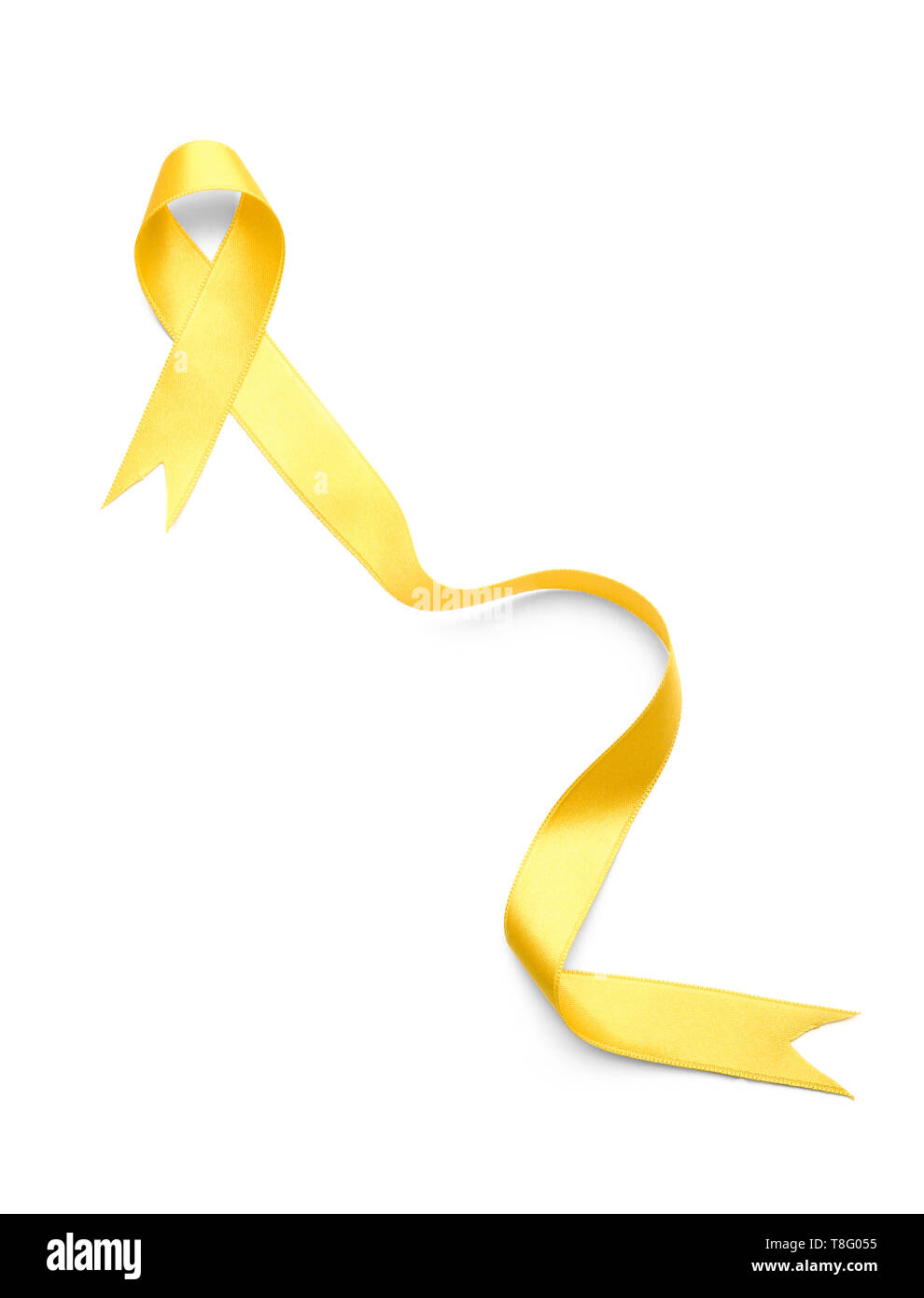 Yellow ribbon on white background. Cancer concept Stock Photo - Alamy