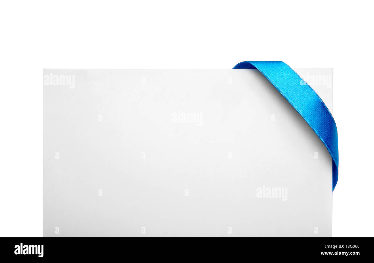 Blank sheet of paper with blue ribbon on white background Stock Photo ...