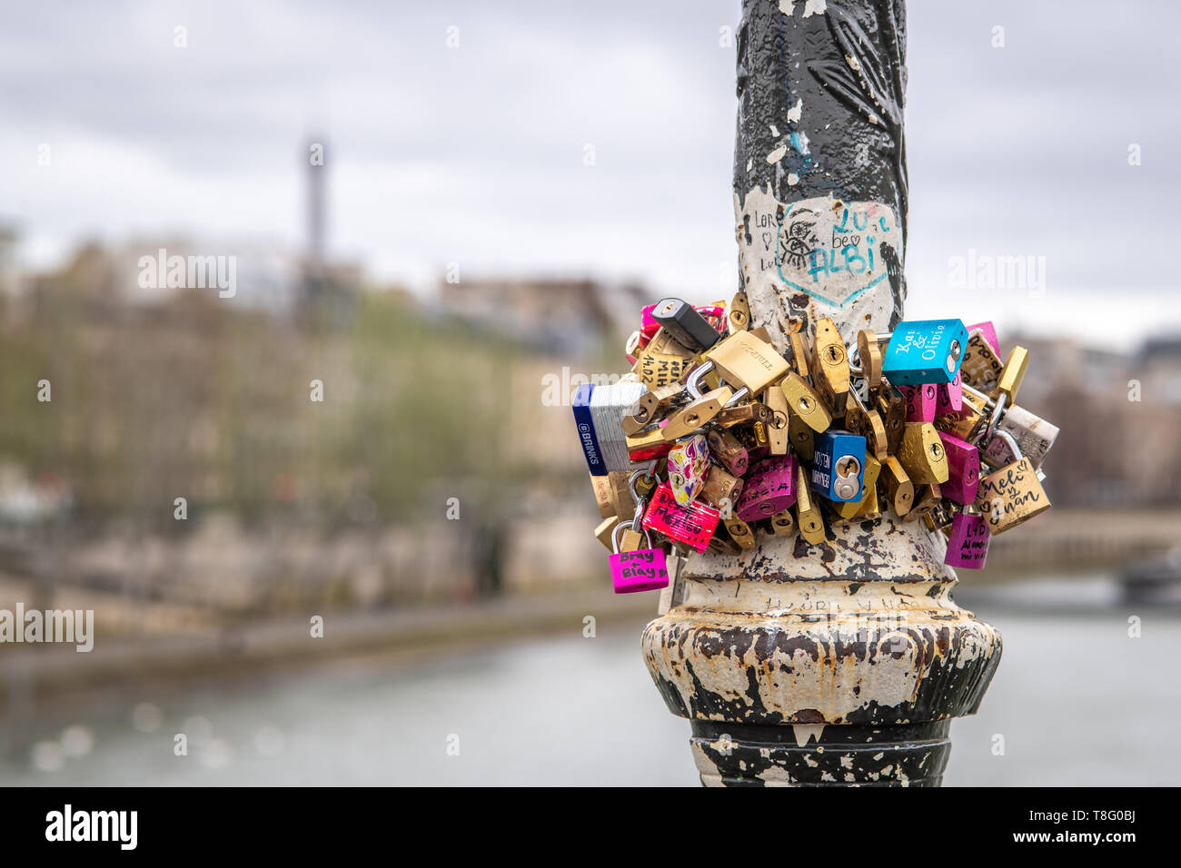 Locks lining the Pont des Arts bridge , also known as the Love Locks ...