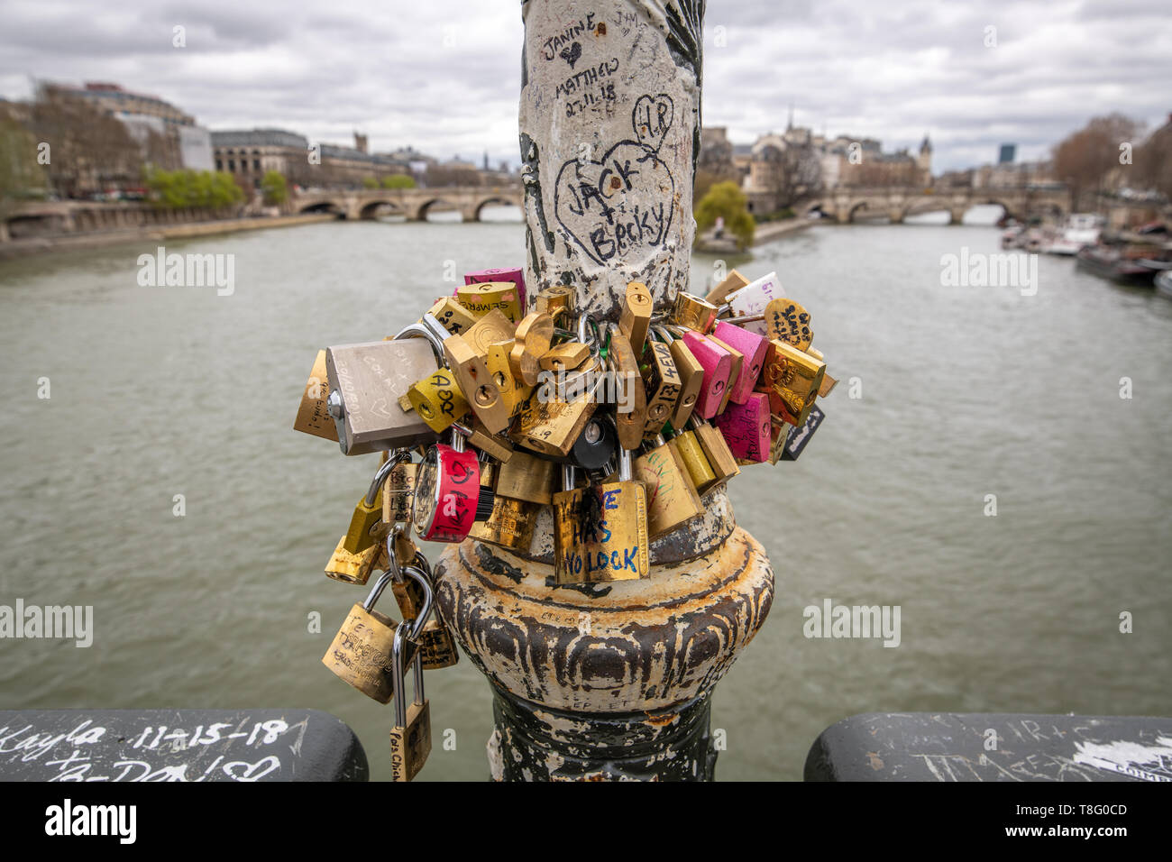 Locks lining the Pont des Arts bridge , also known as the Love Locks ...