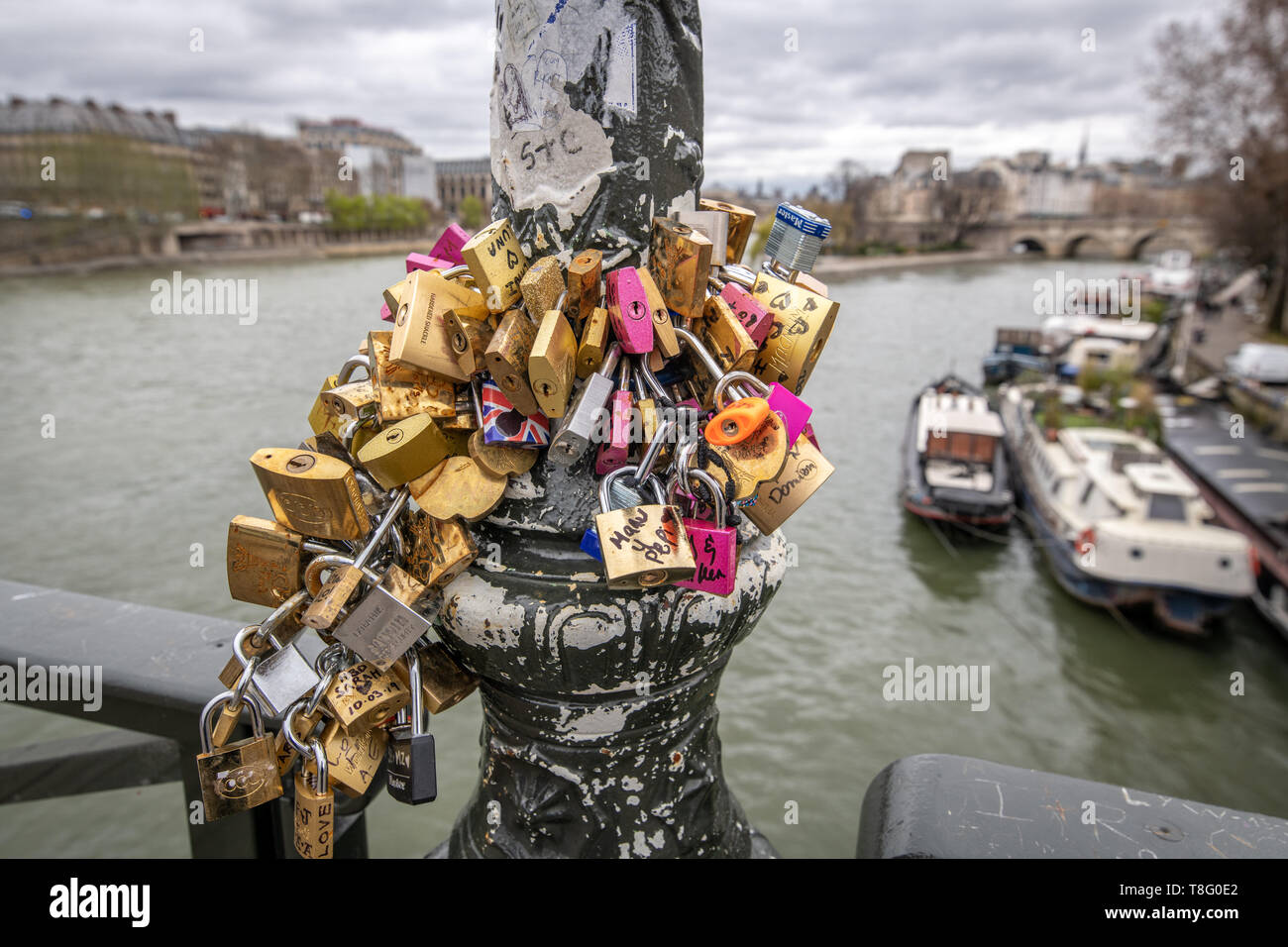 Locks lining the Pont des Arts bridge , also known as the Love Locks ...