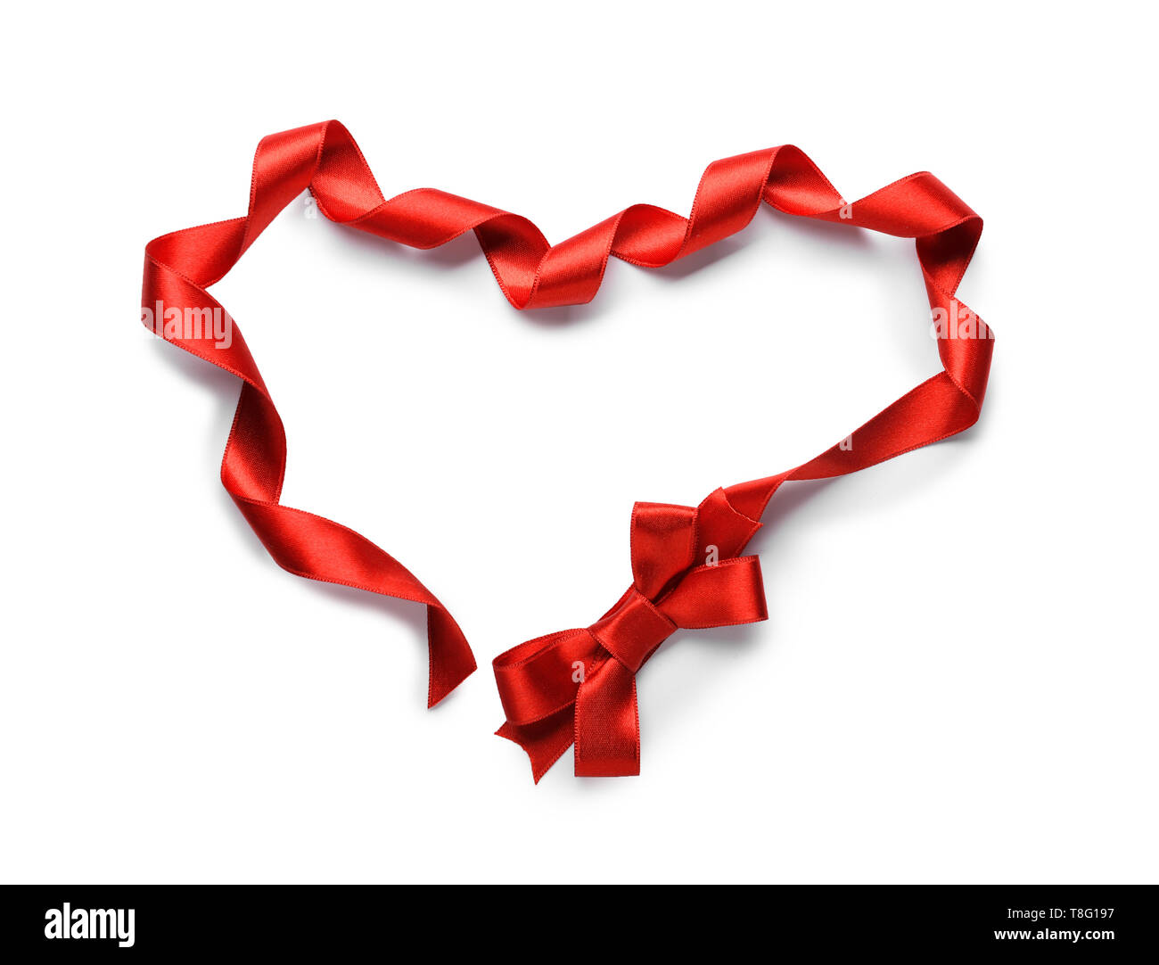 Heart made of red ribbon on white background Stock Photo - Alamy