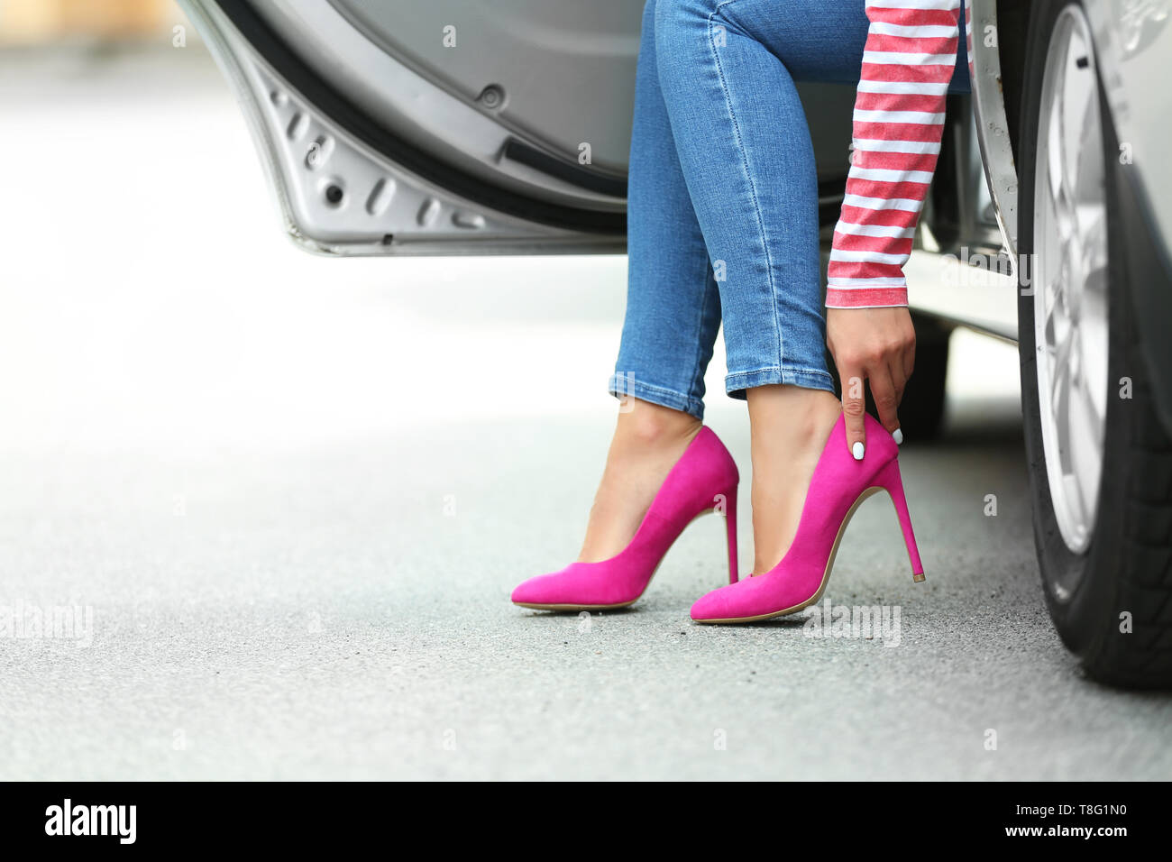 Legs car door hi-res stock photography and images - Alamy