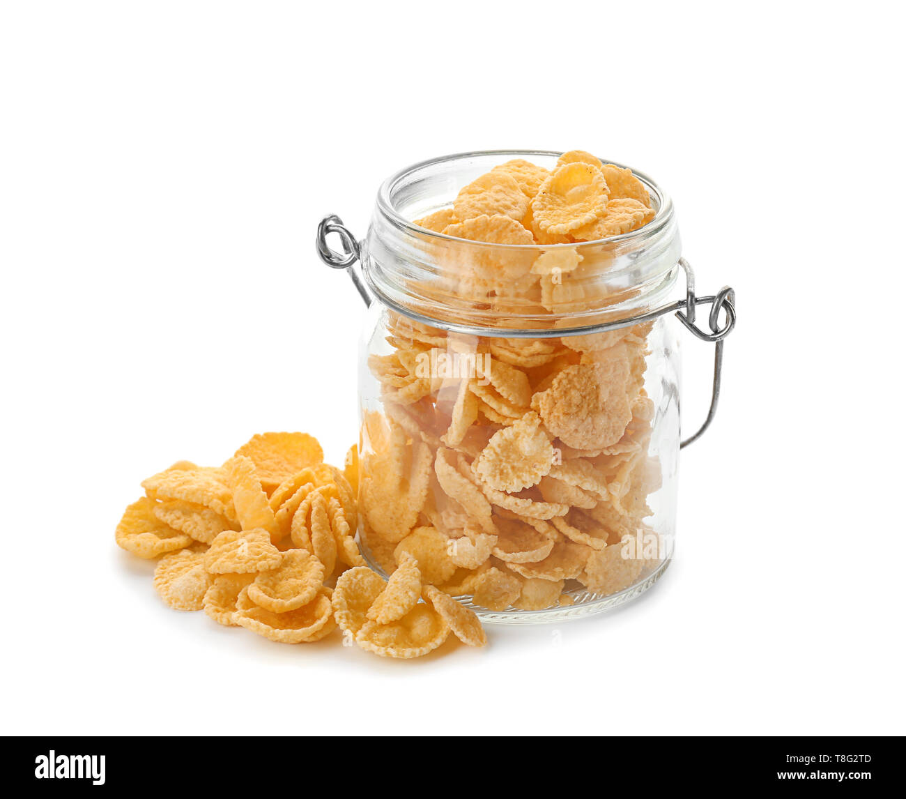 Glass jar with healthy cornflakes on white background Stock Photo - Alamy