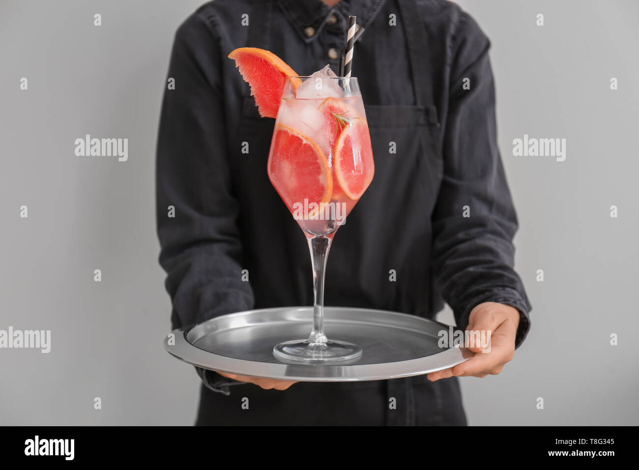 Cocktail waitress tray hi-res stock photography and images - Alamy