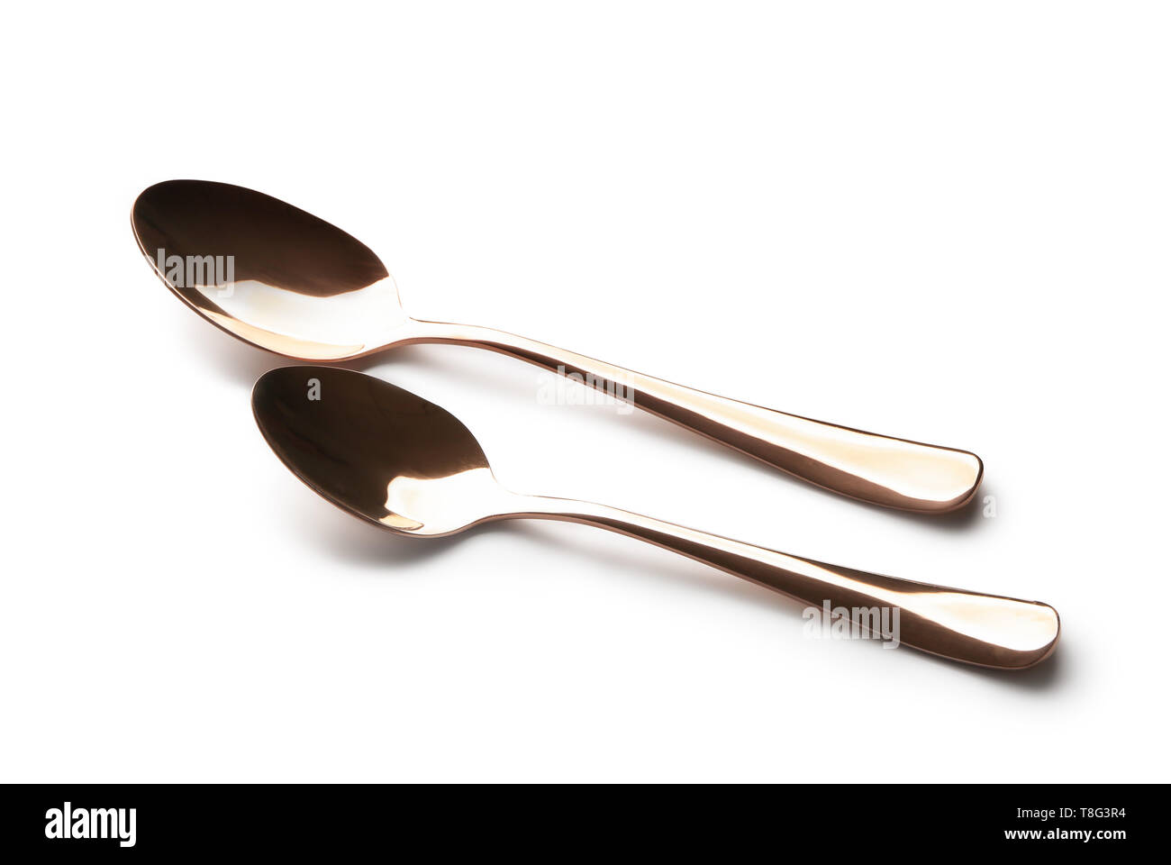Spoons on white background Stock Photo - Alamy
