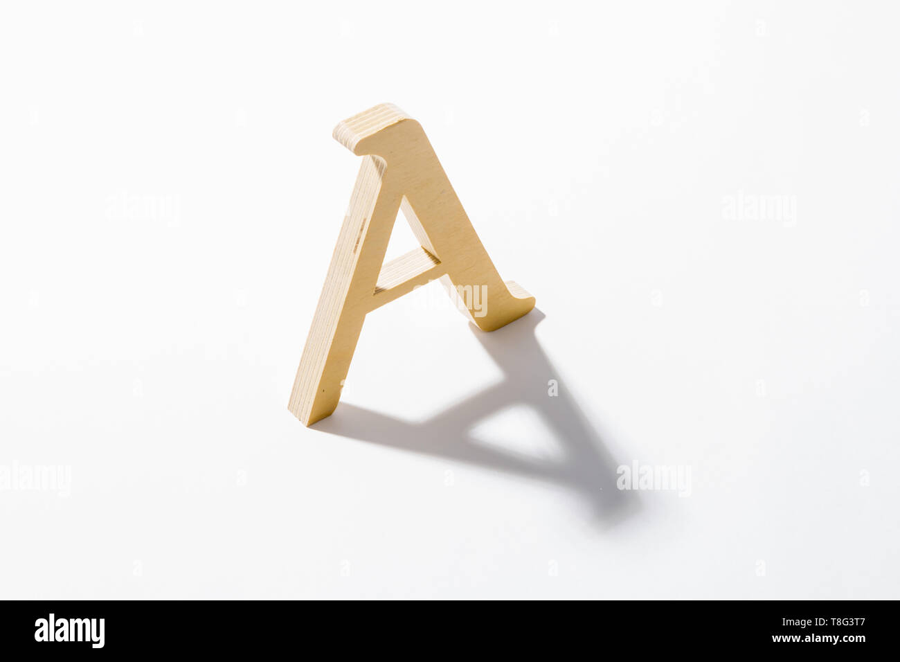 Wooden Alphabet A and Shadow Reflection Stock Photo - Alamy