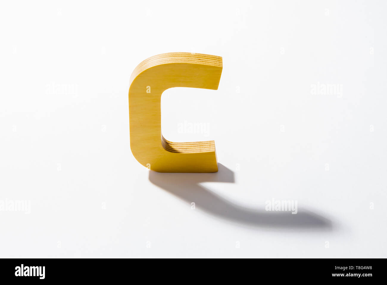 Wooden Alphabet C and Shadow Reflection Stock Photo - Alamy