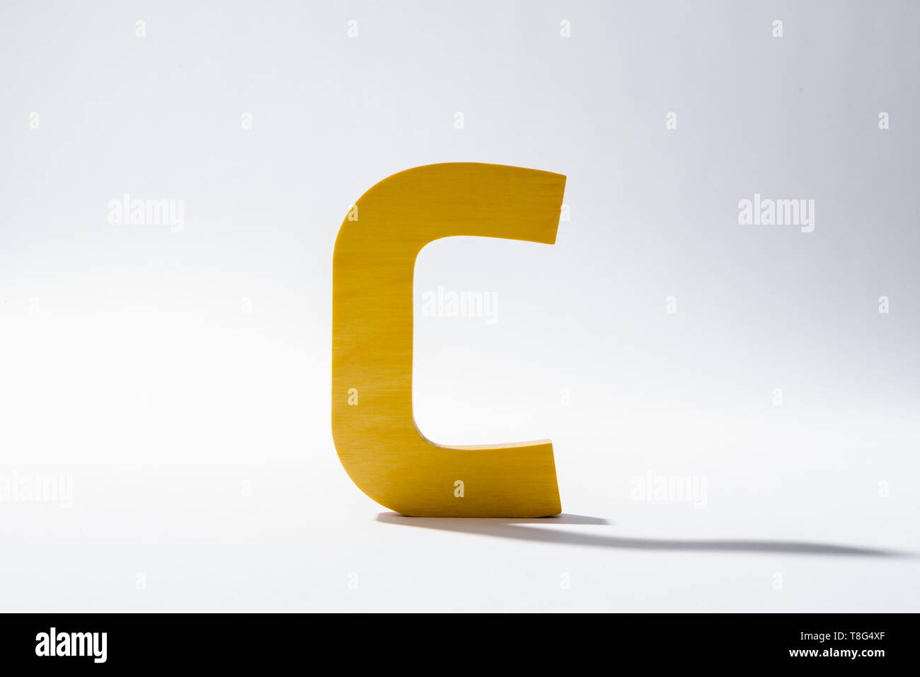 Wooden Alphabet C and Shadow Reflection Stock Photo - Alamy