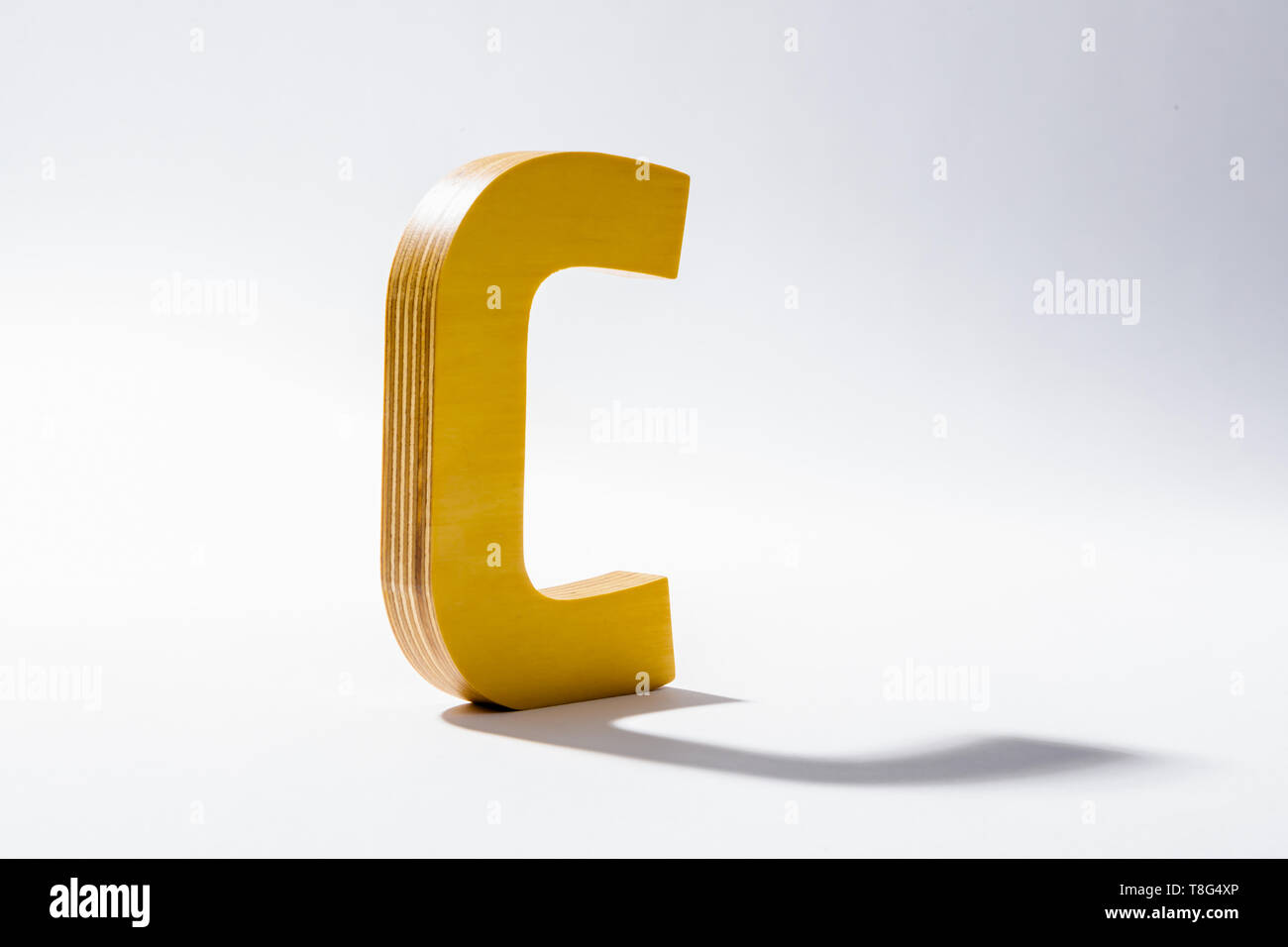 Wooden Alphabet C and Shadow Reflection Stock Photo - Alamy