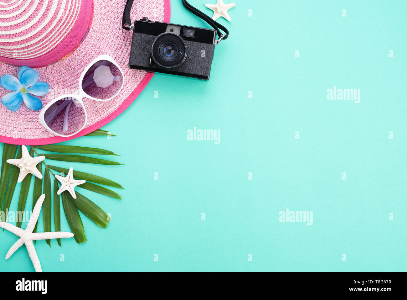Beach accessories retro film camera, sunglasses, flip flop starfish ...