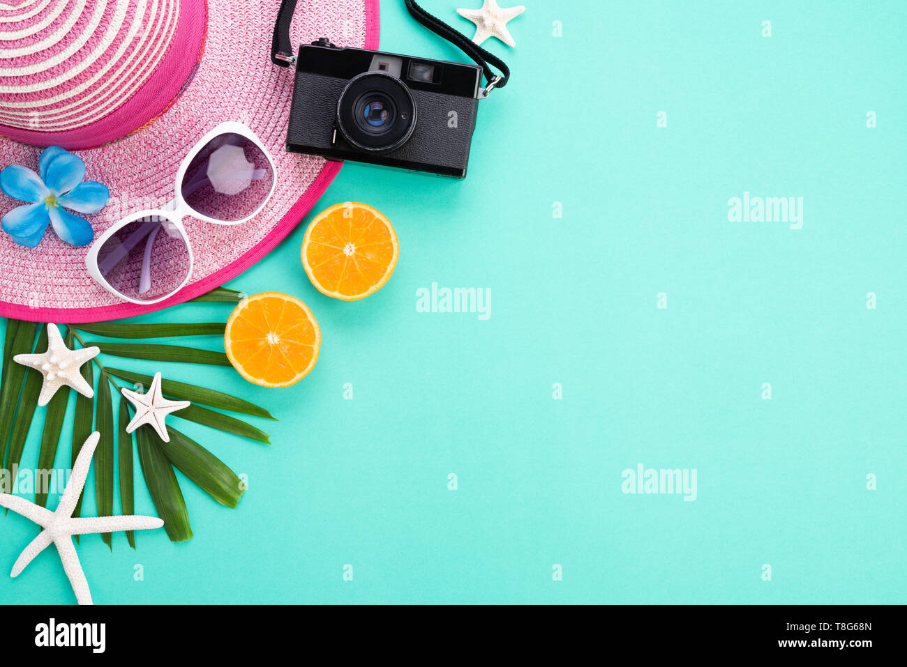 Beach accessories retro film camera, sunglasses, flip flop starfish ...