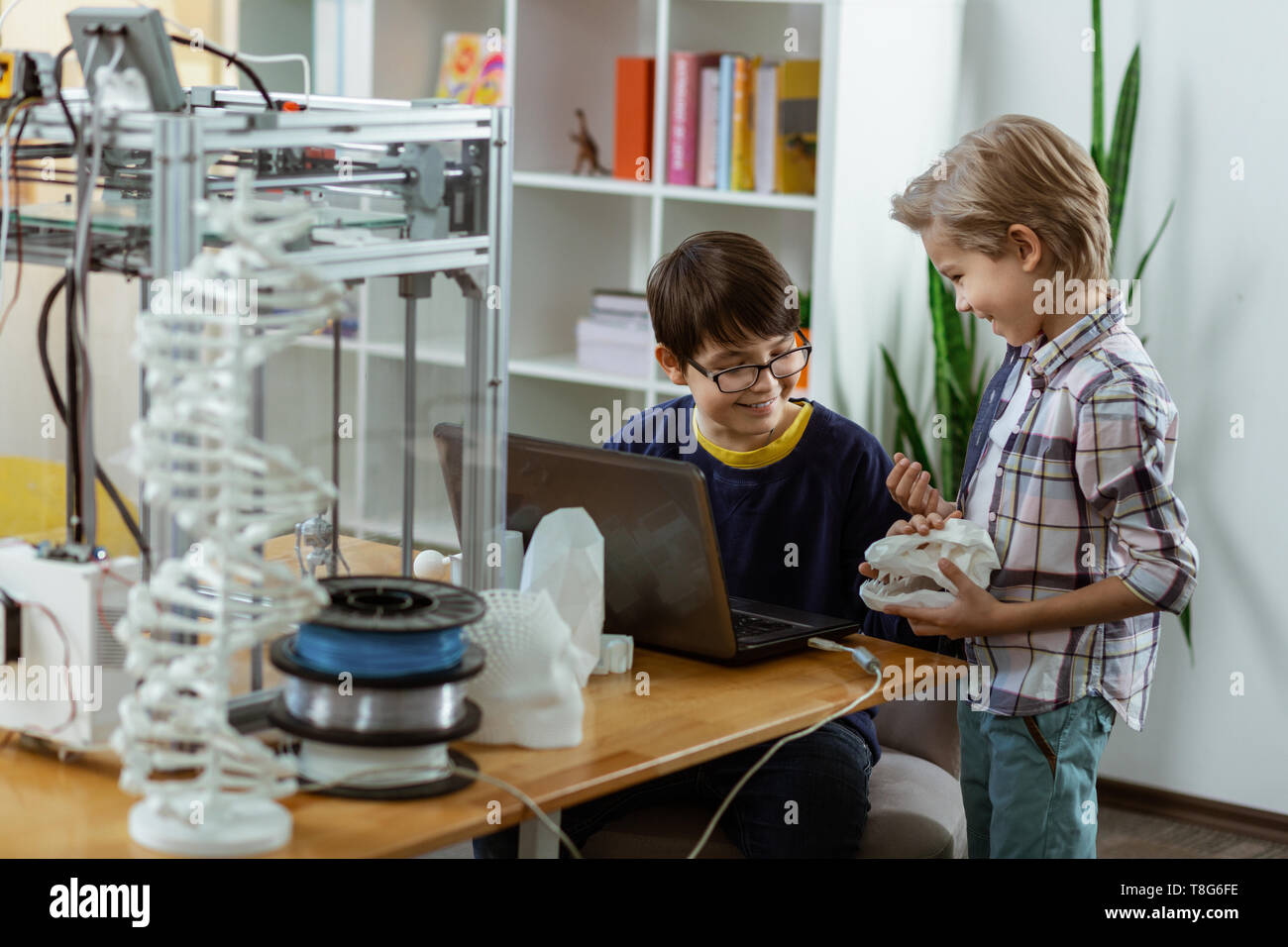 Adult observing children hi-res stock photography and images - Alamy