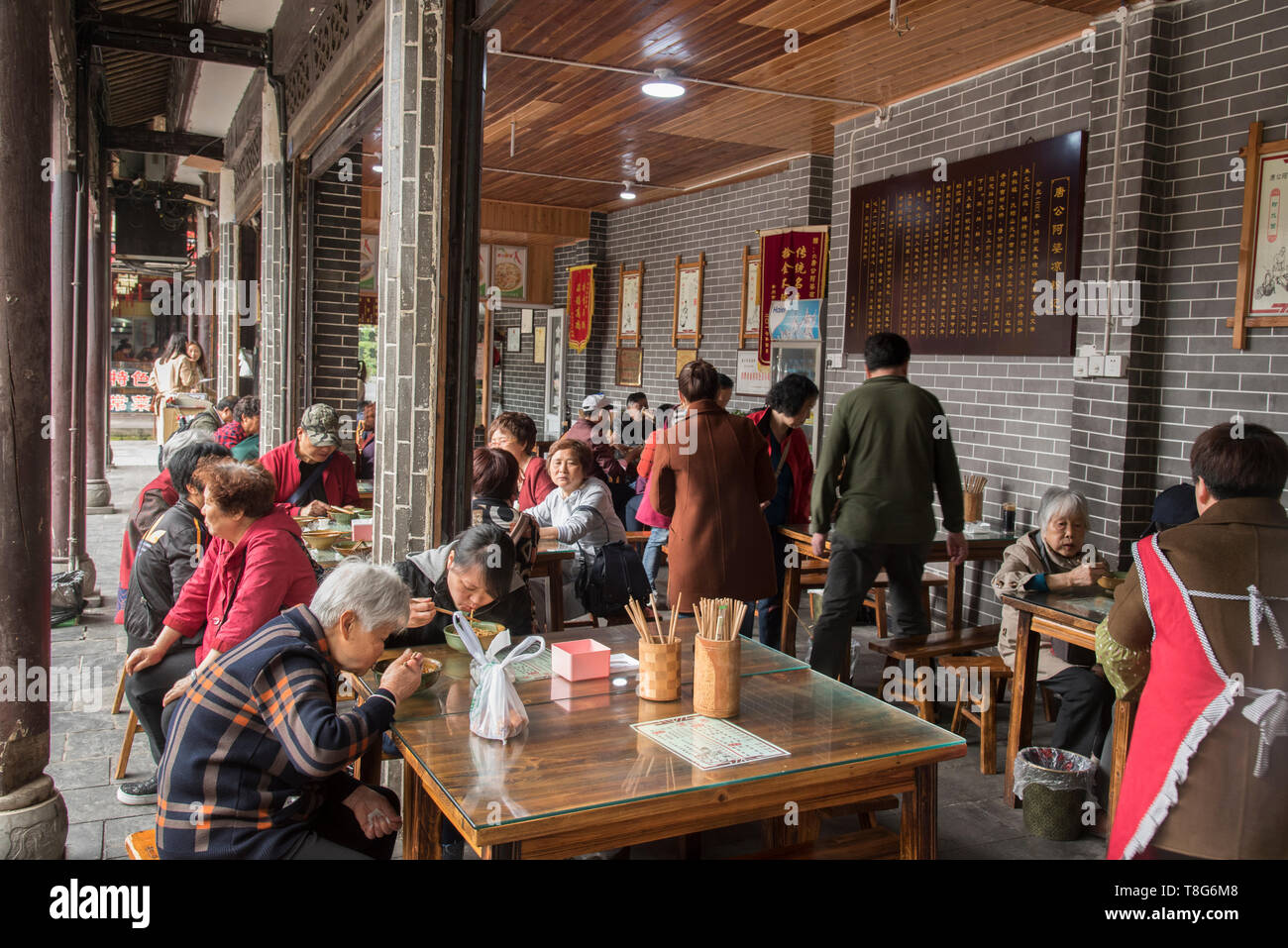 Chinese Street food. Food vendor sells food at a stall in Sichuan ...